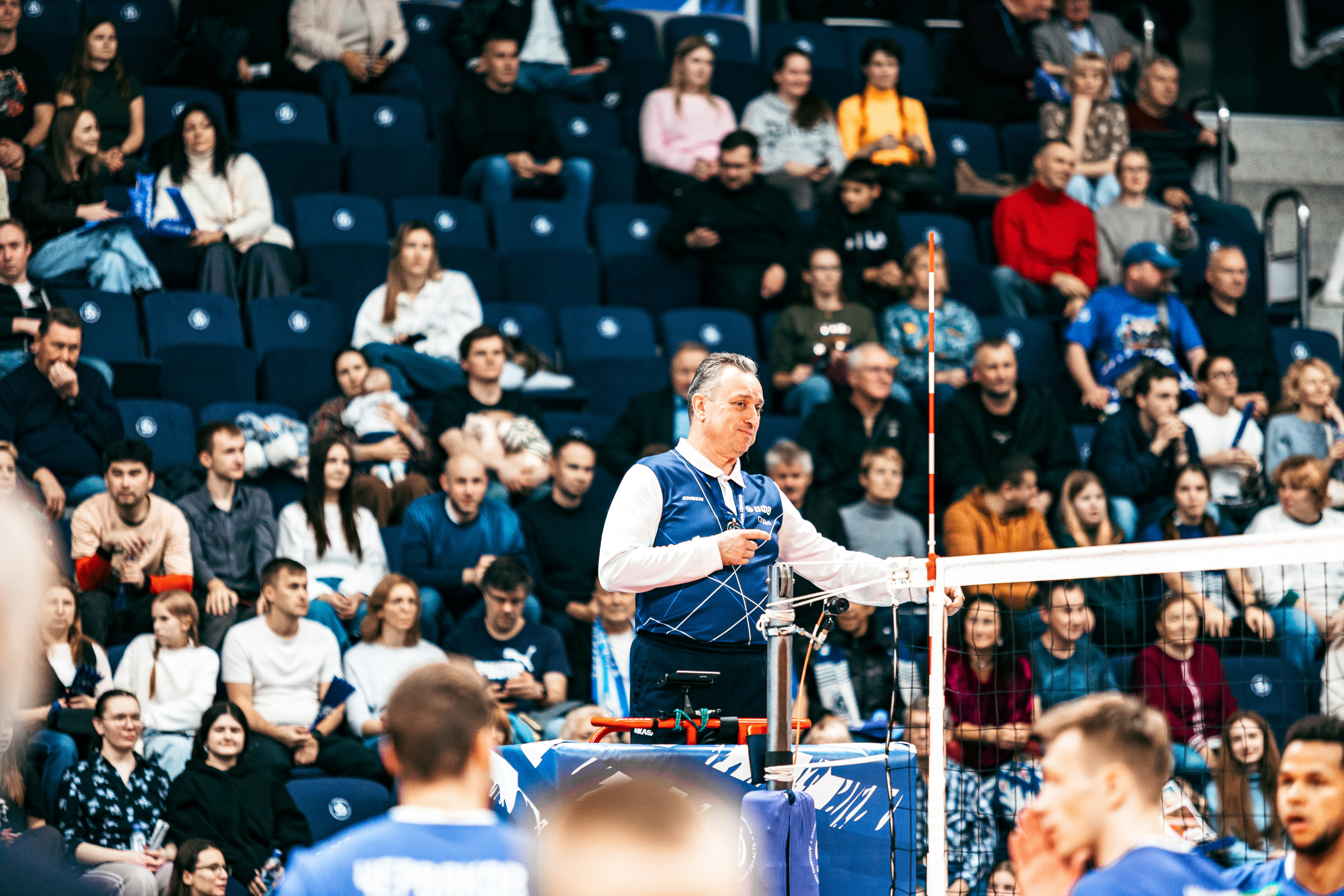 Umpire at the Net: Focused Authority During a Volleyball Rally
