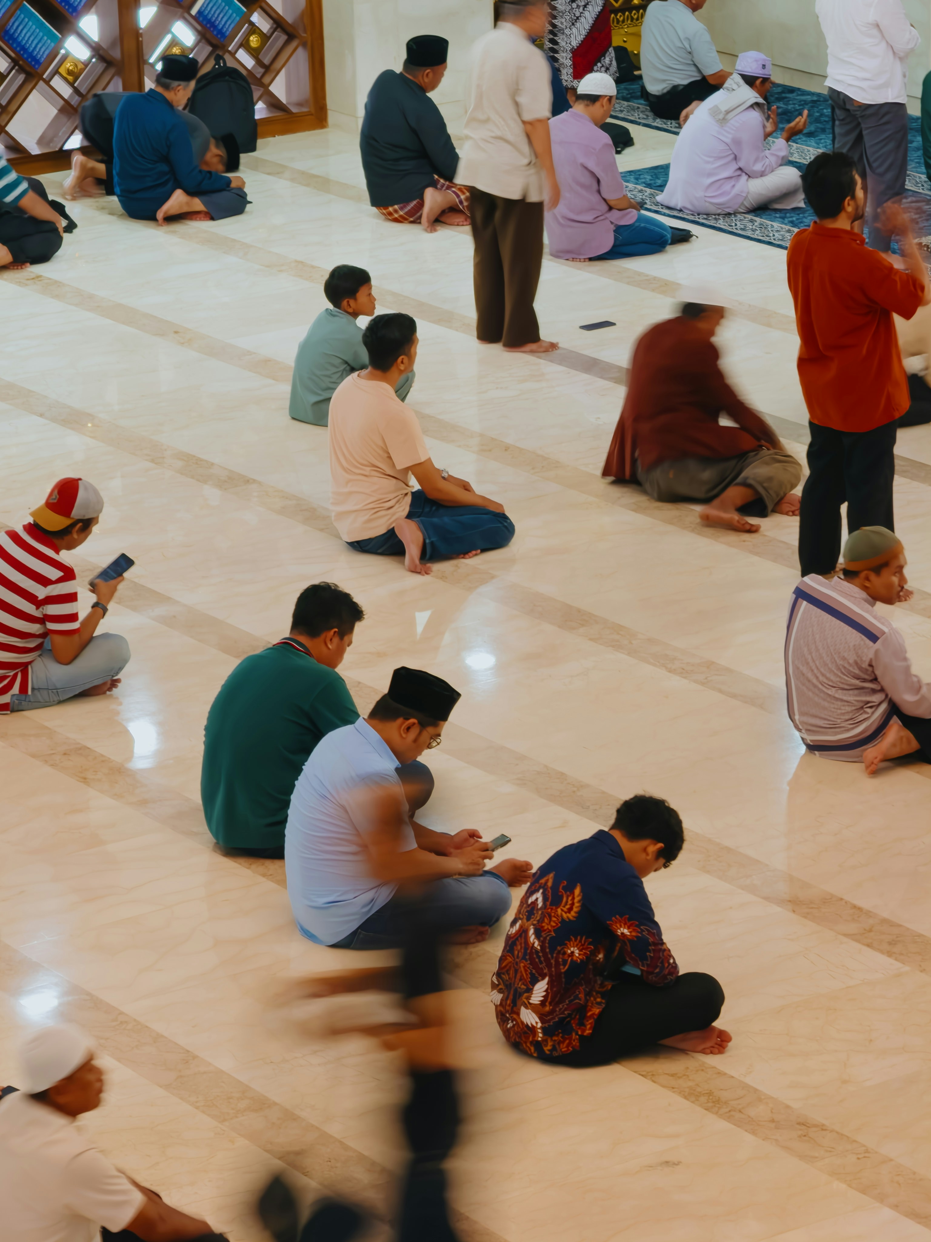 Quiet Reverence: Rows of Worshippers in a Mosque Hall