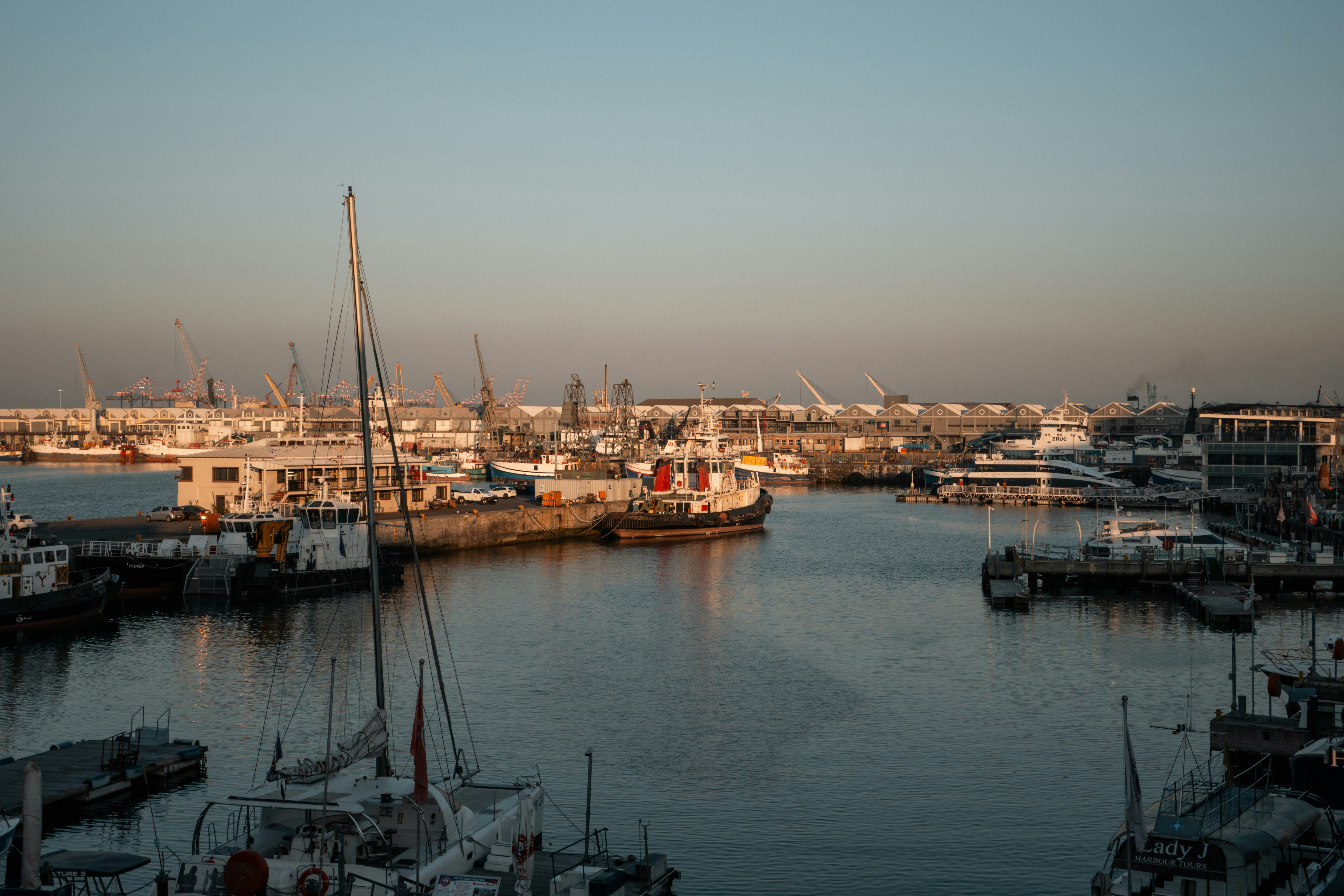 Harbor Quiet: Boats at Dusk in a Coastal Marina