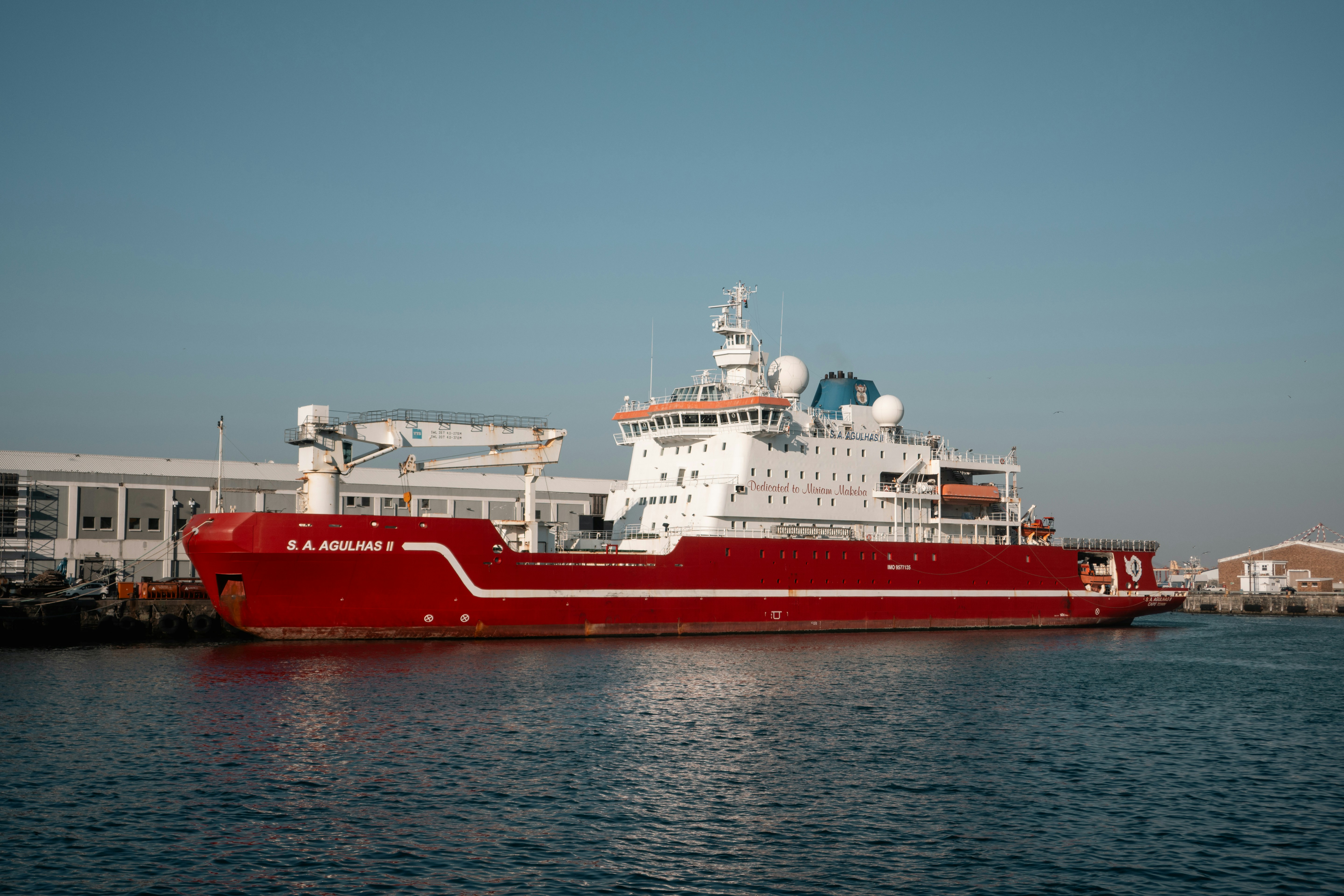 Red Vessel at the Harbor: A Detailed Dockside Profile