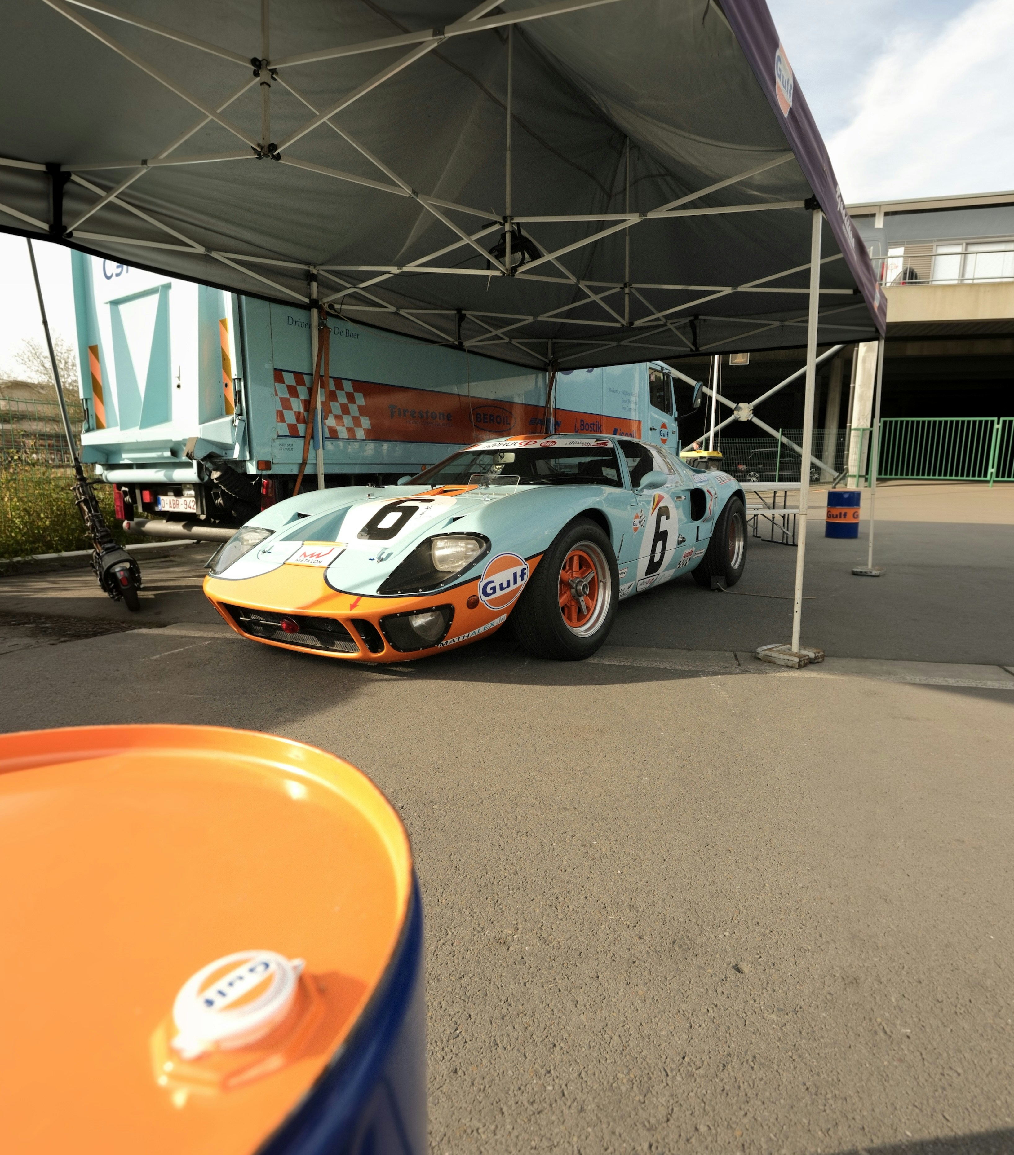 Gulf-Livered Porsche Under Temporary Pit Canopy