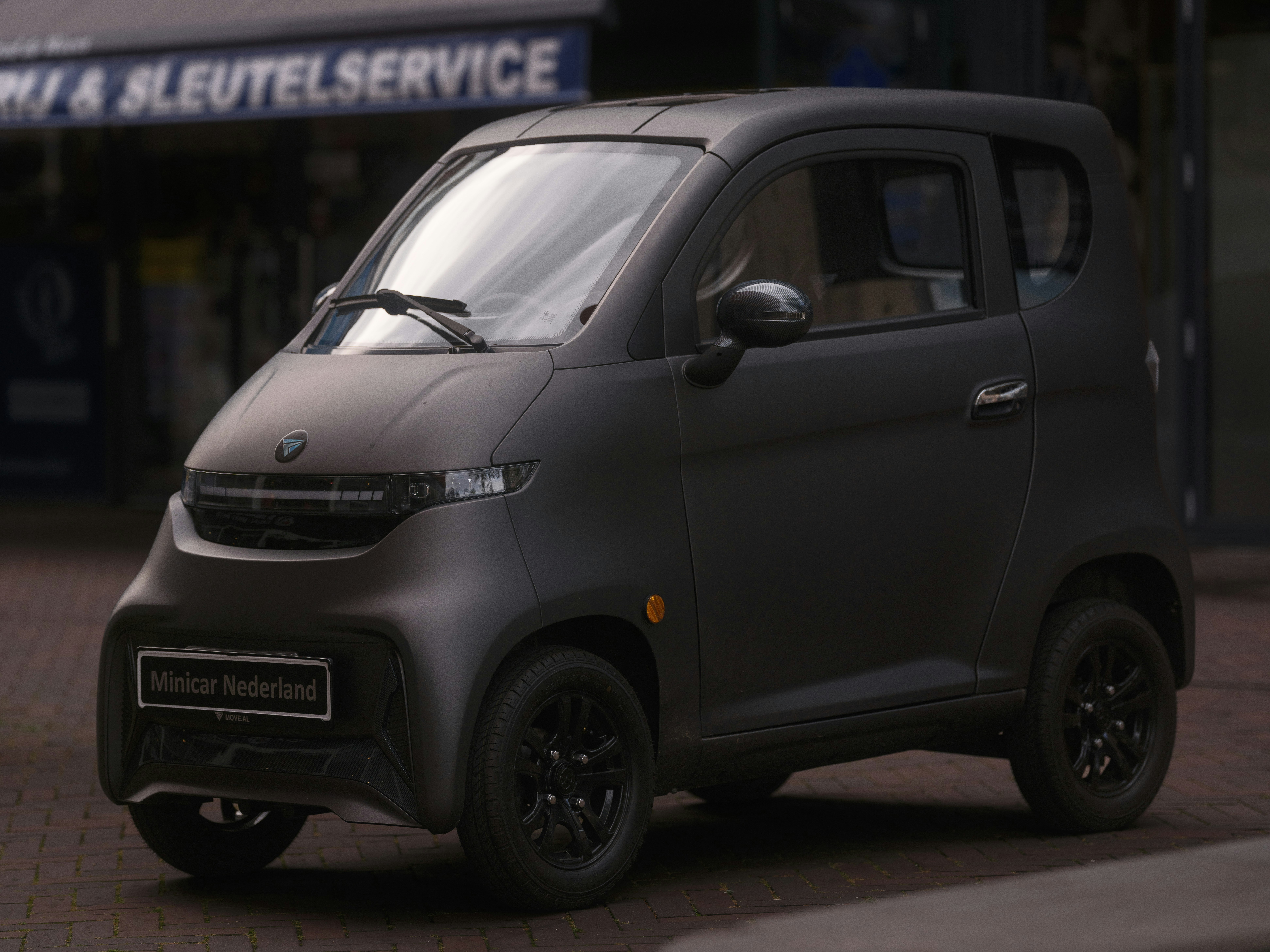Urban Microcar in Matte Gray: Curves and Compact Confidence