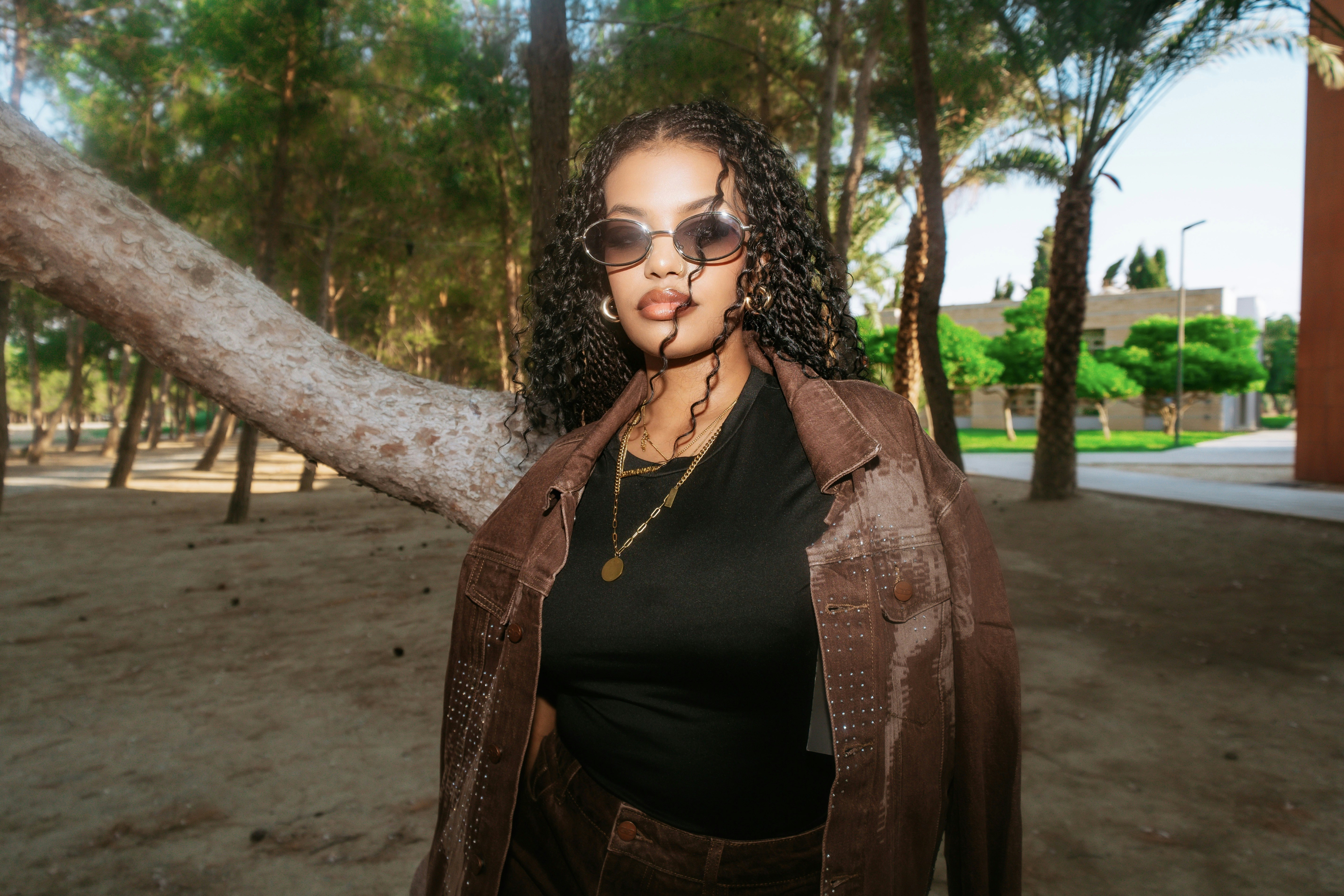 Leather Jacket Whisper: A Confident Portrait in Shade and Sunlight