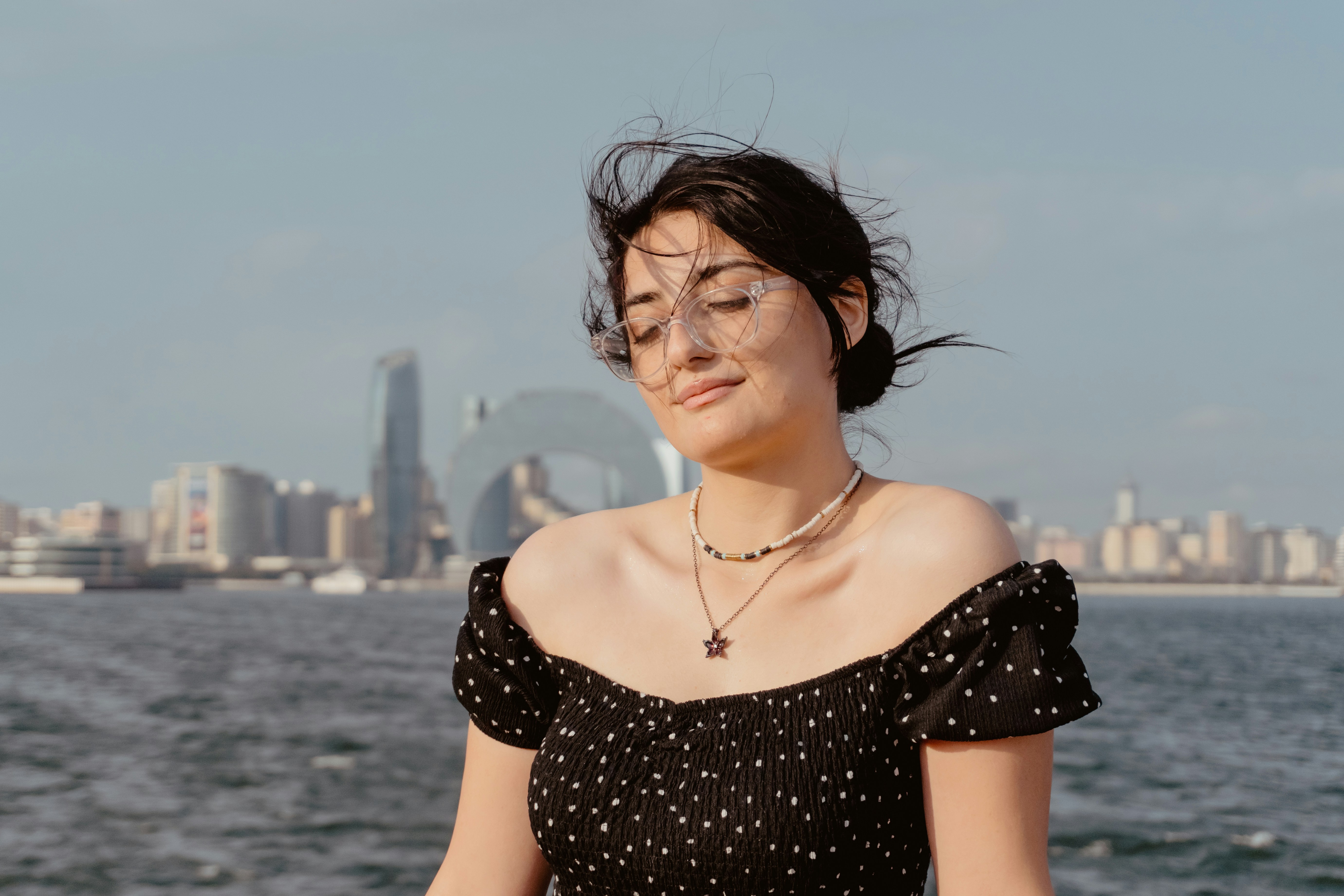Ocean Breeze Portrait with Cityscape Backdrop