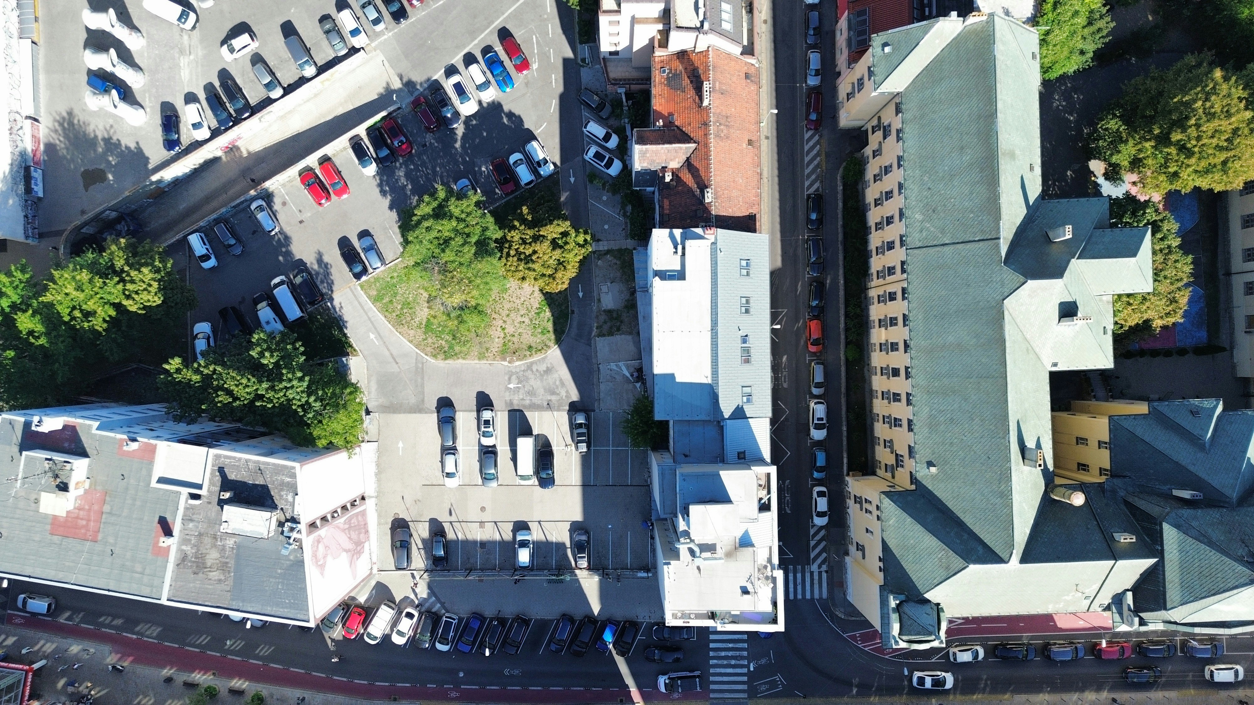Aerial Tapestry: Urban Roofs and Street Grid