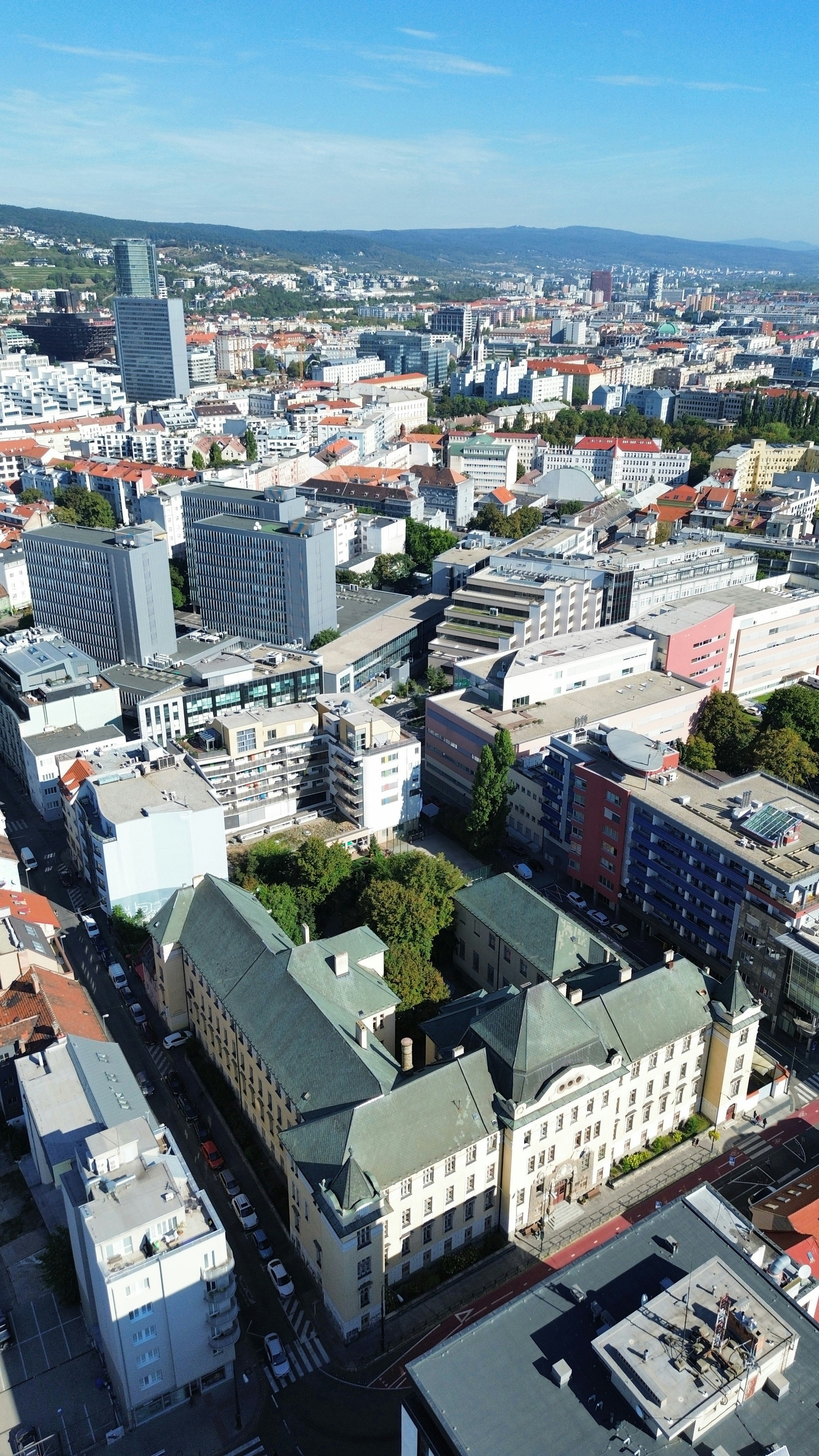 Aerial Overlook: Tiled Cityscape under Clear Sky