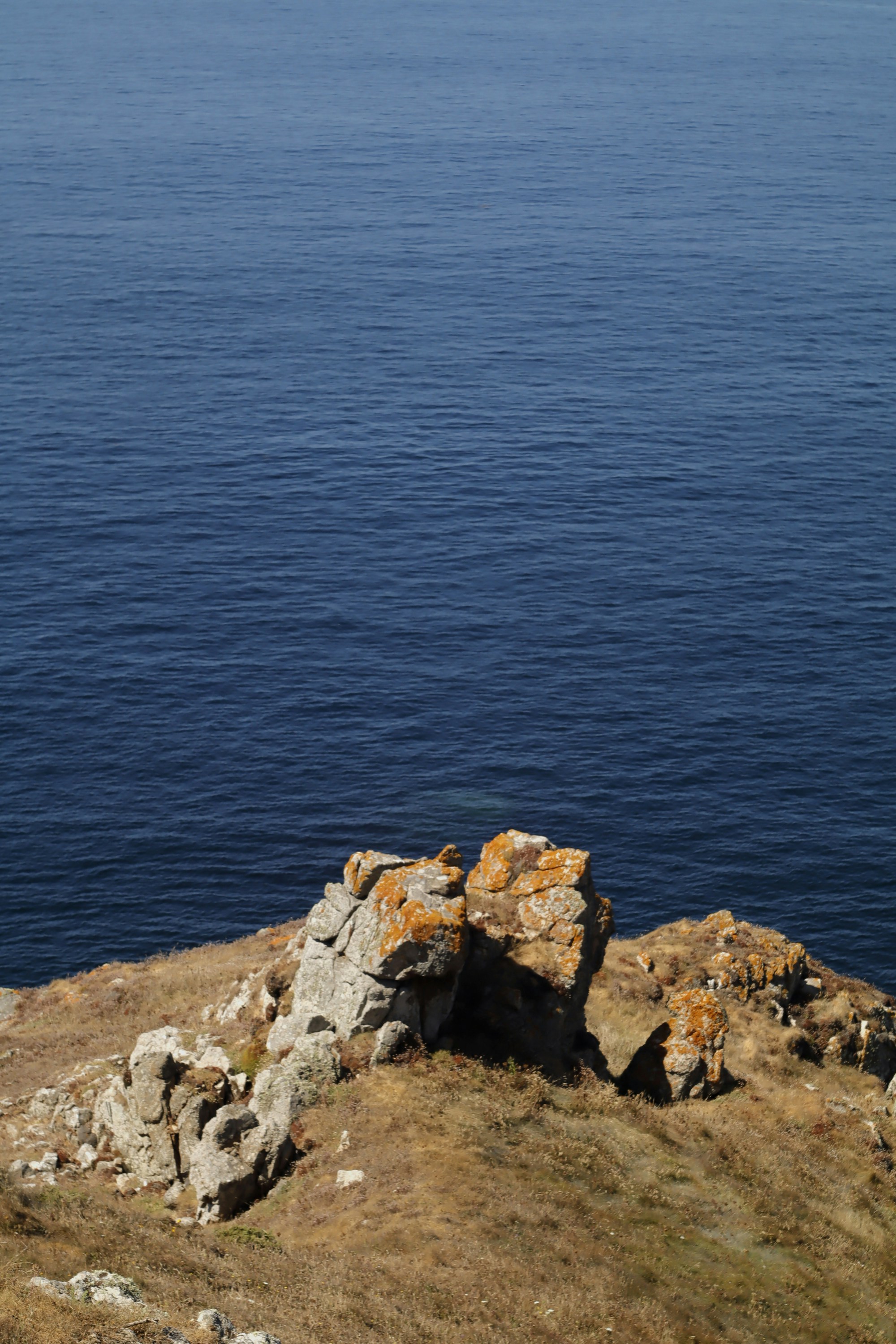 Rugged Cliffs Meet Endless Blue