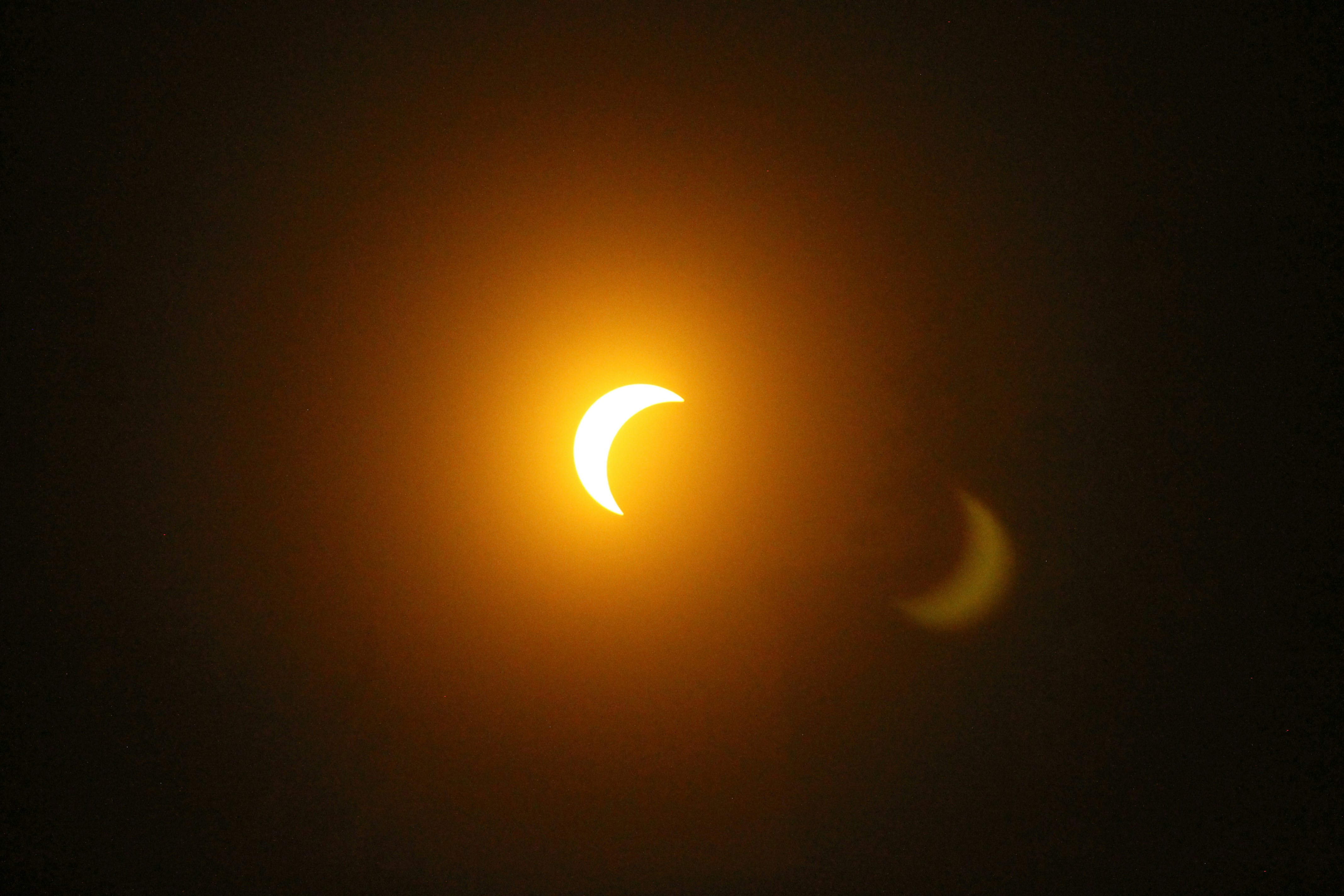 Crescent Moon Kiss: Dual Phases of a Night Eclipse