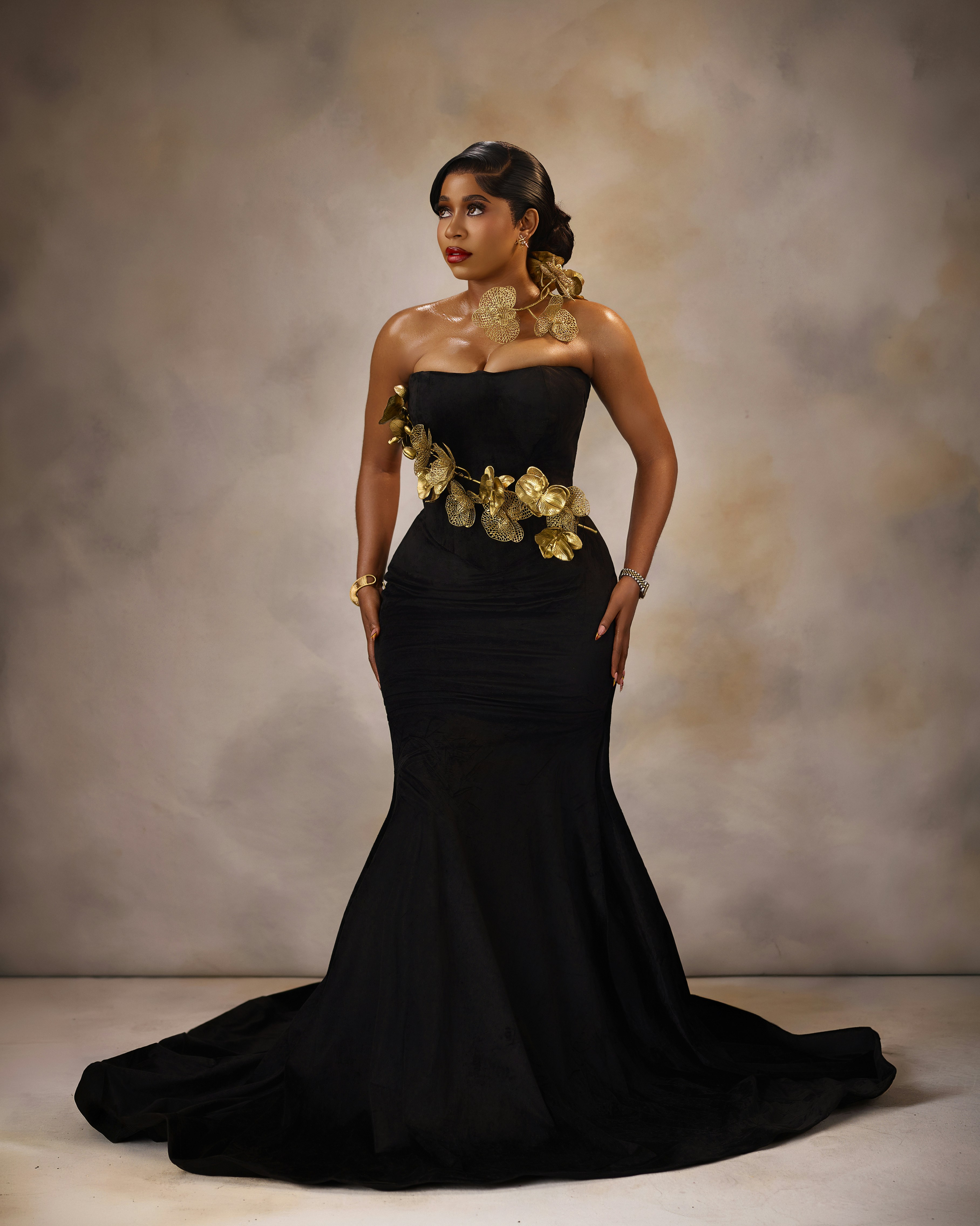 Midnight Grace: A Black-Tie Pose with Golden Flourish