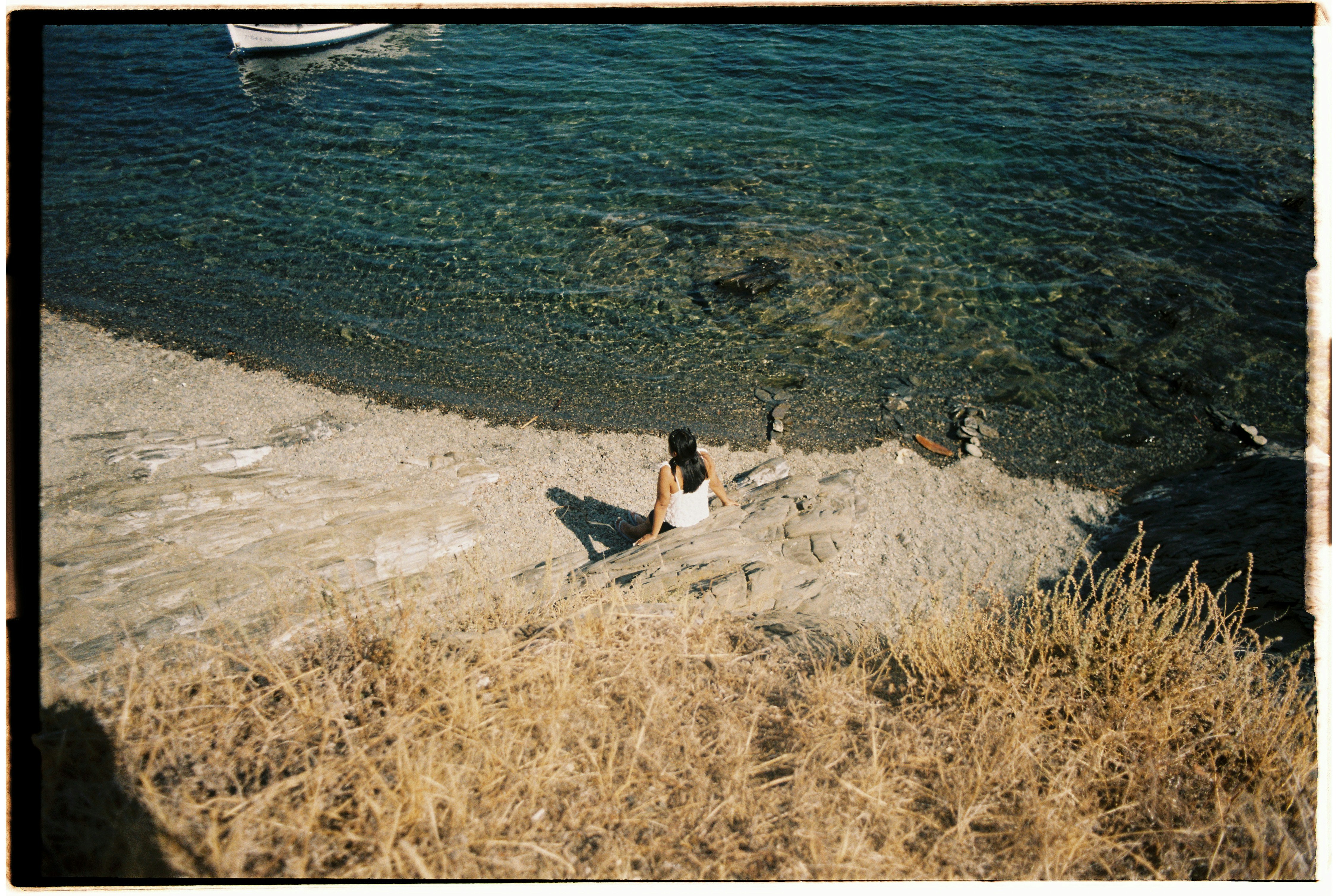 Quiet Shoreline: A Figure in the Pebble Beach