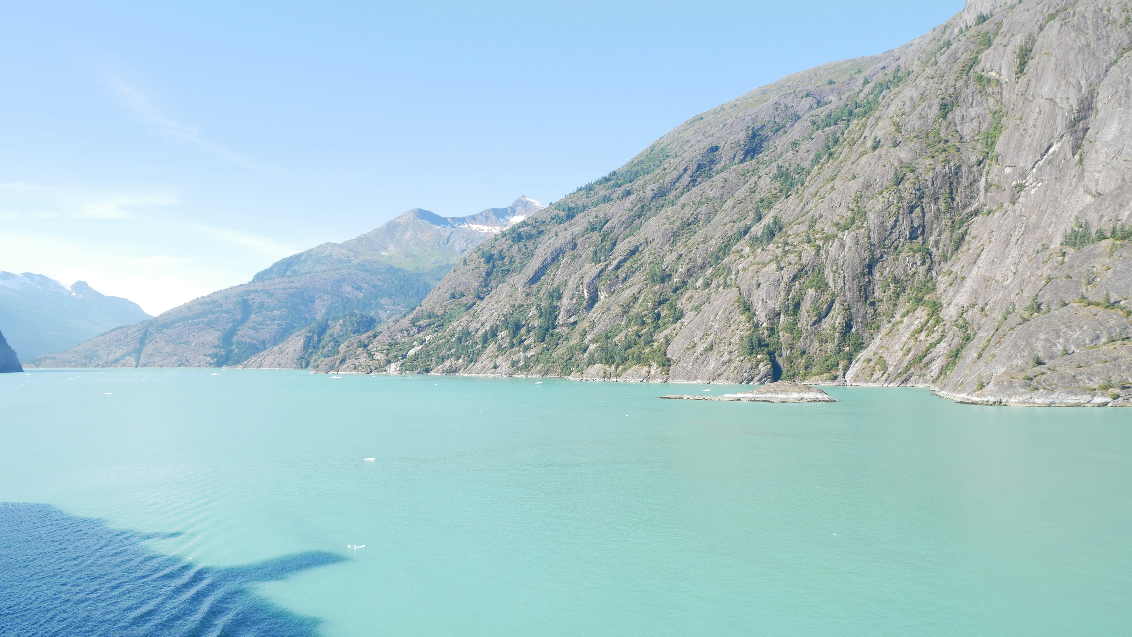 Turquoise Fjord Under Clear Skies