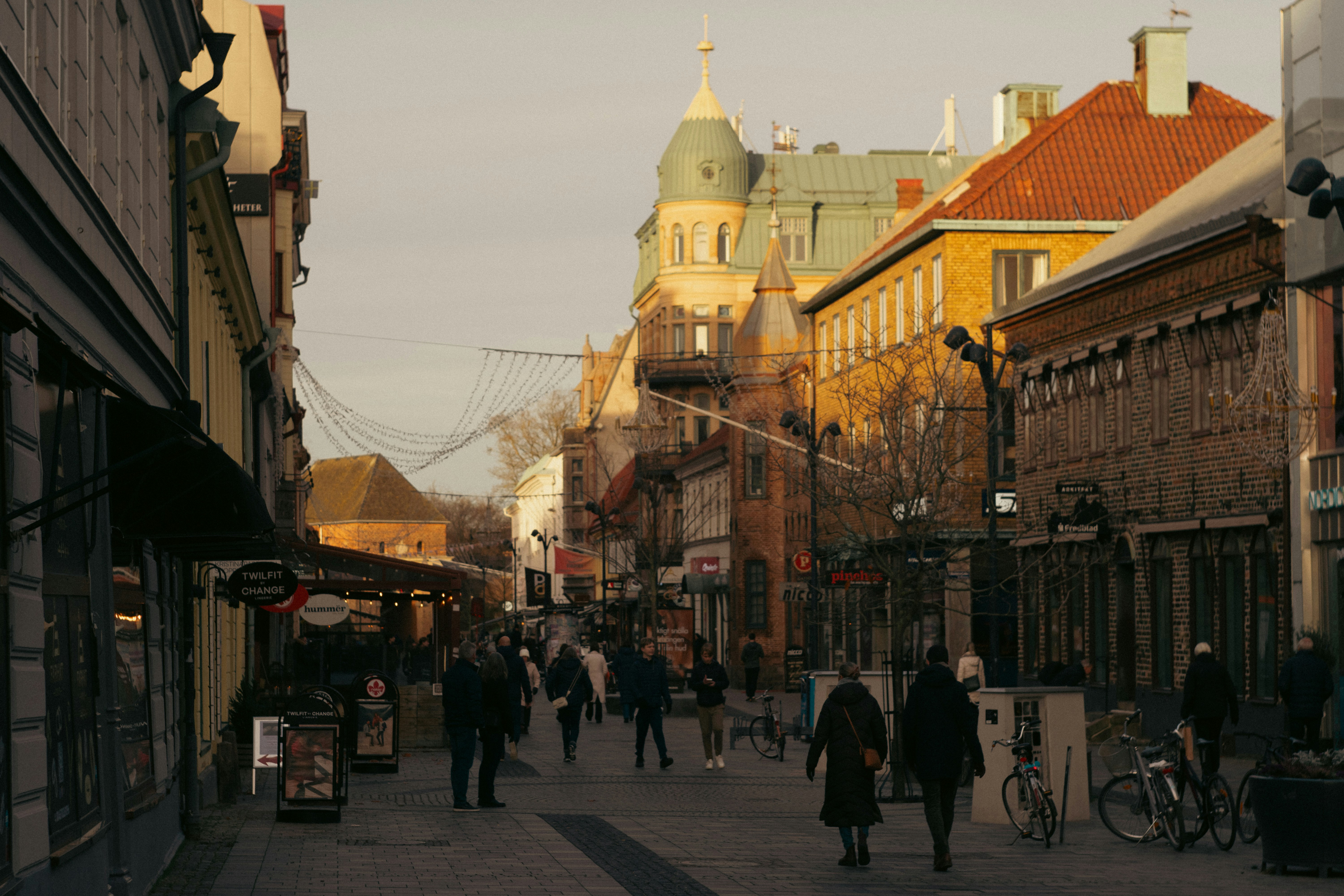 Evening Pedestrian Lane Toward the Towered Corner