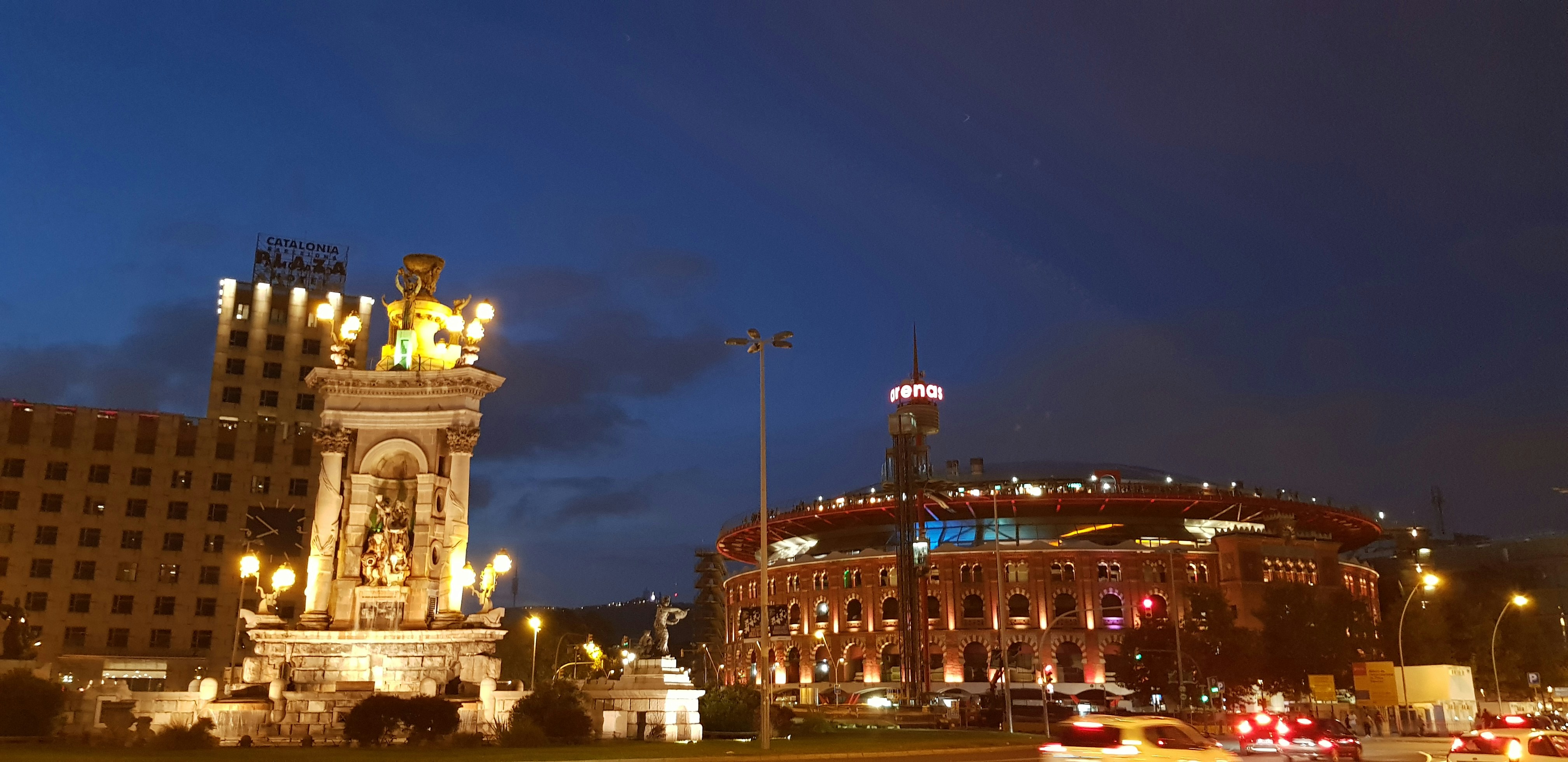 The illuminated Font de Montjuïc and Arenas de Barcelona at night in Barcelona