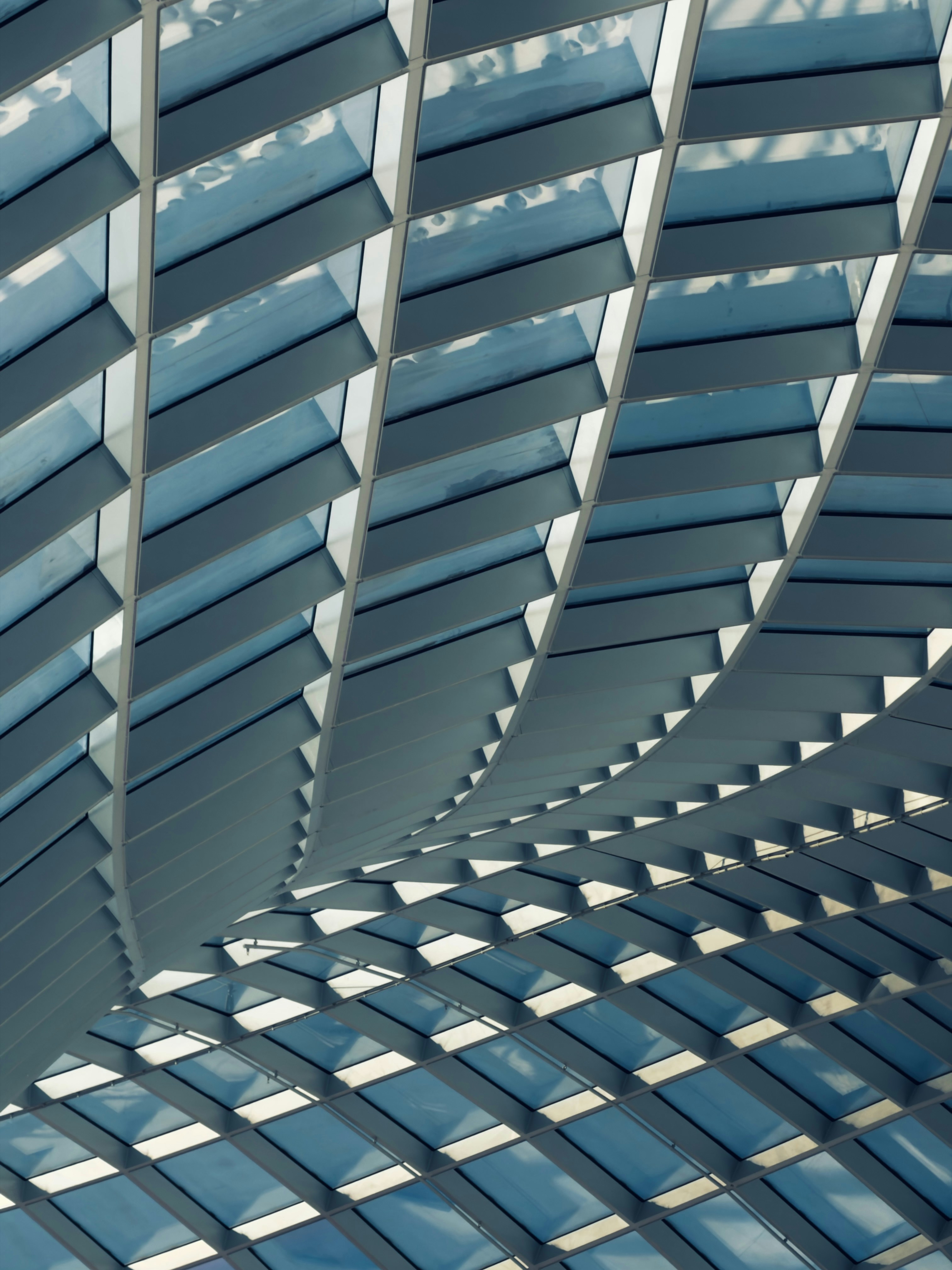 Architectural Convergence: A Helix of Glass and Steel