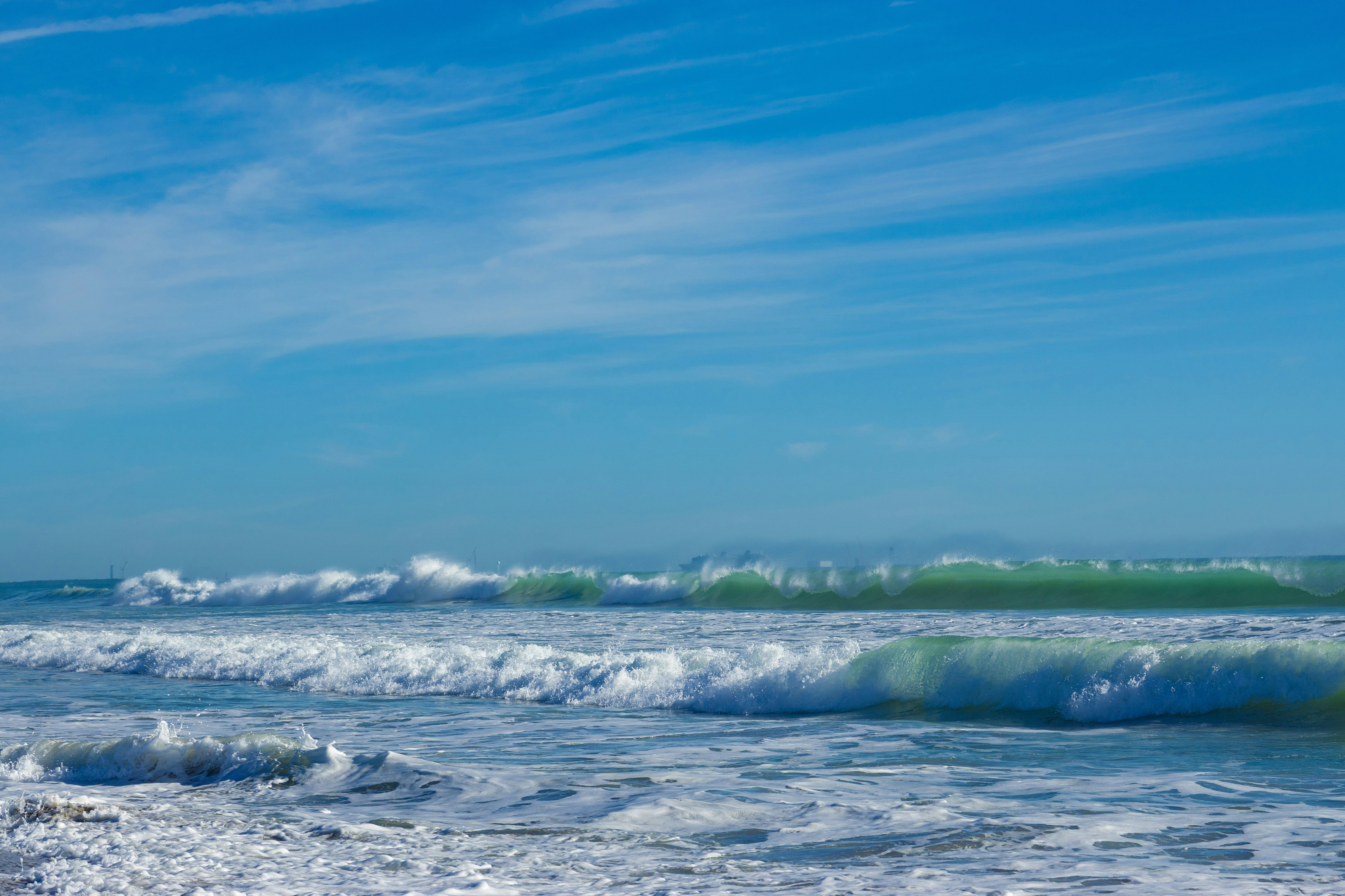 Line of Breakers: A Quiet Horizon over Green-Ced Sea