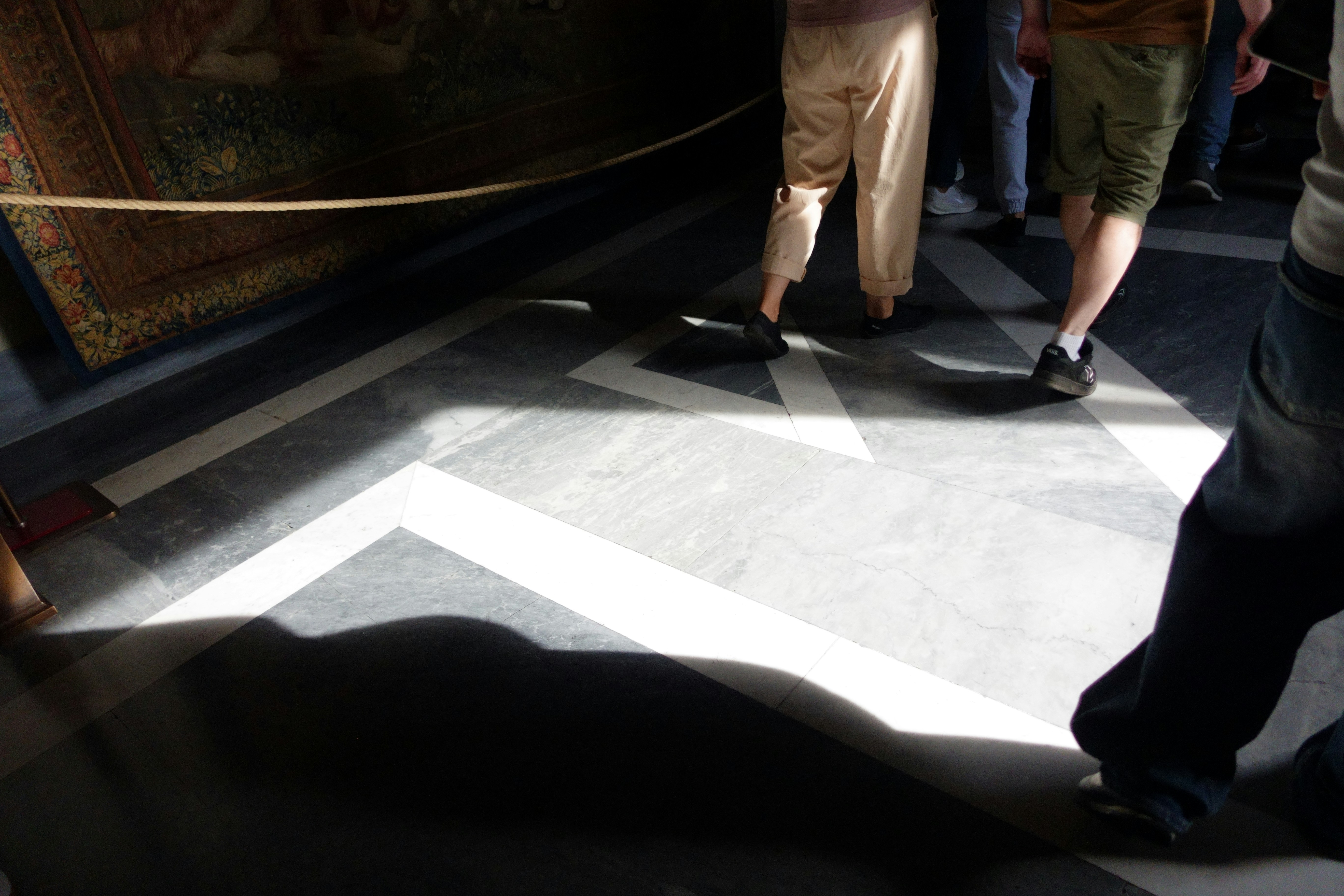 Footpath Geometry: Shadows and Stride in a Museum Hall