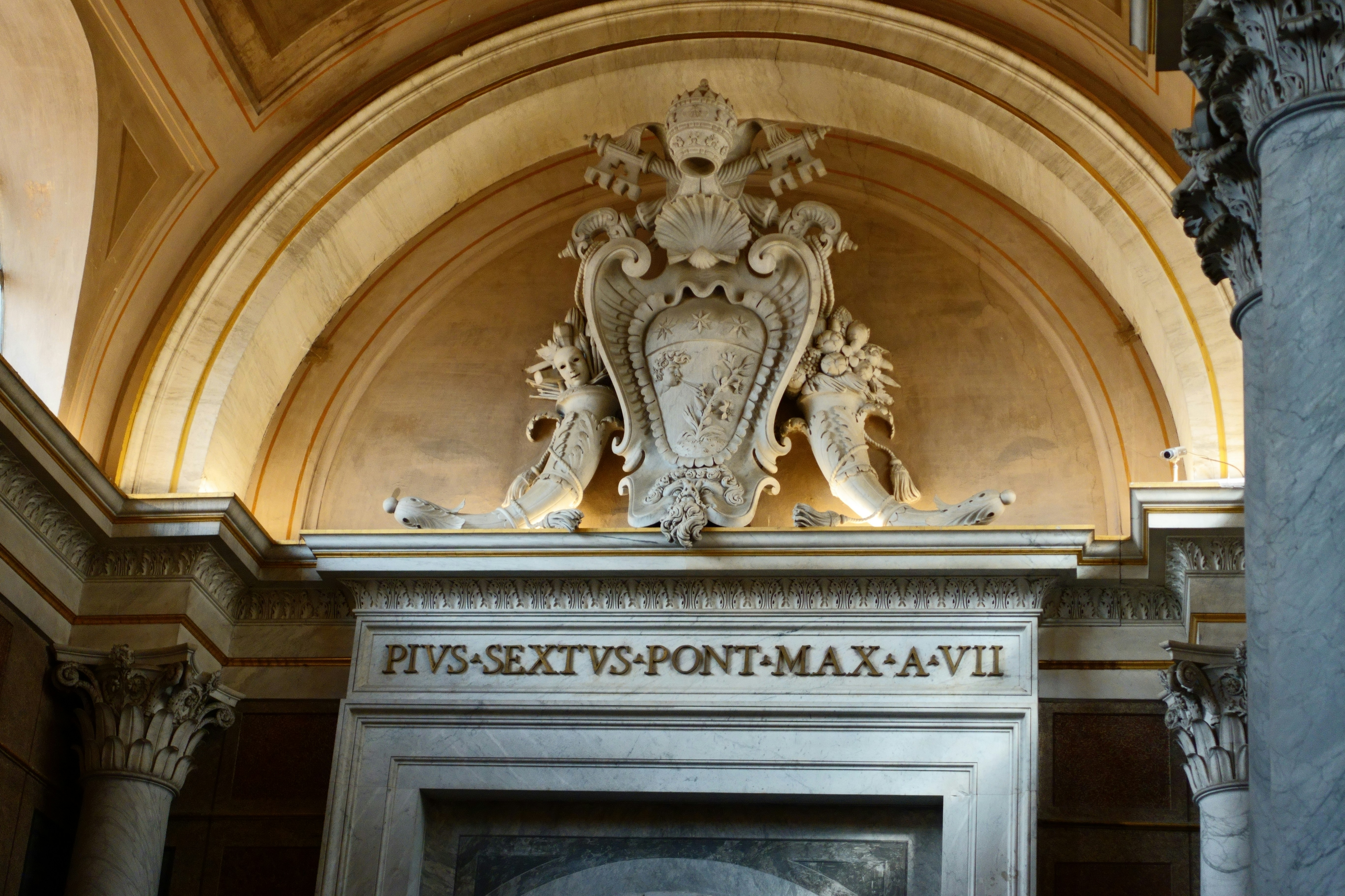 Guardian Crest Above the Archway: Carved Emblem of Authority