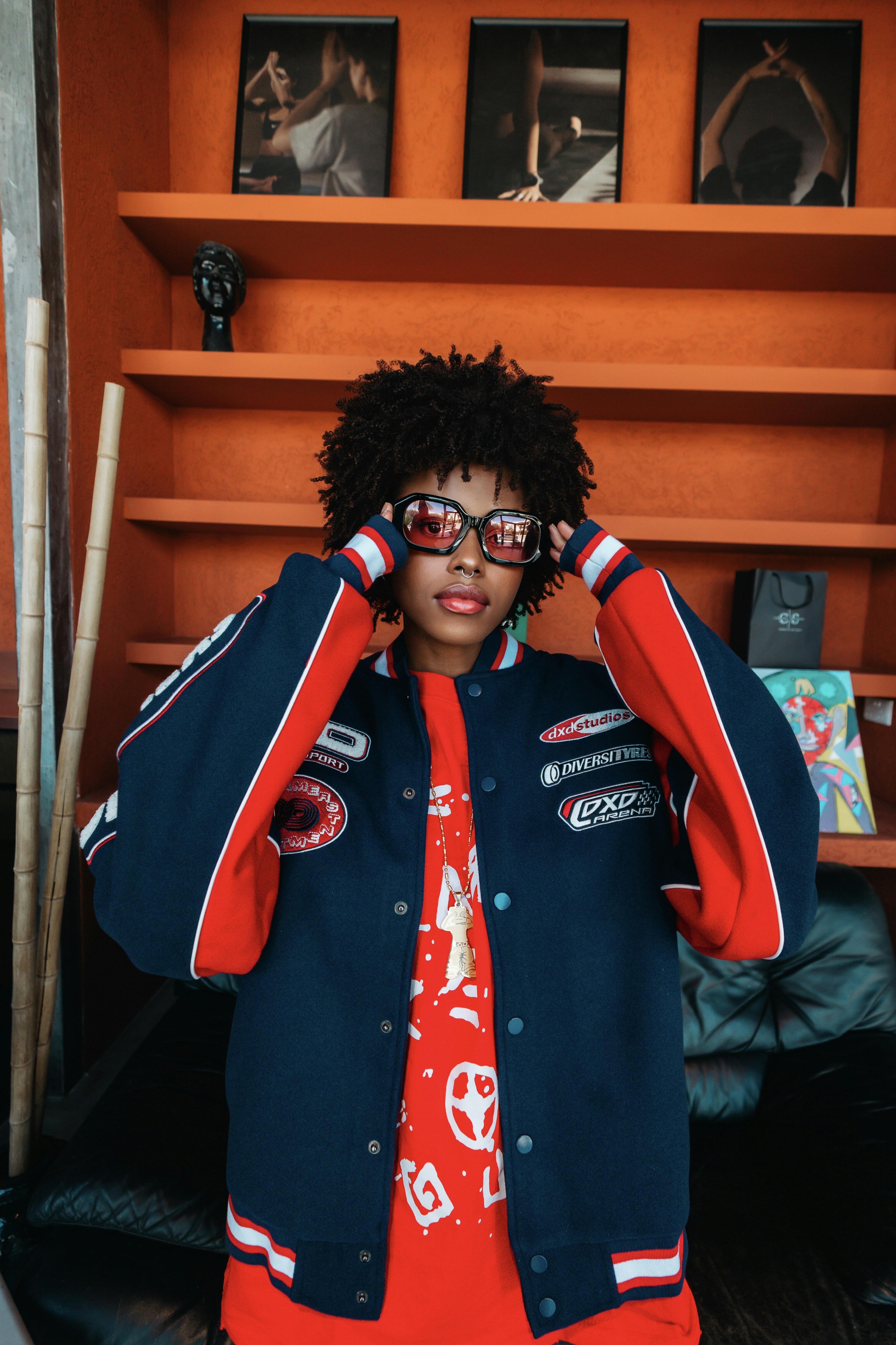 Retro-futurist Style: Streetwear Rebel in a Neon-orange Studio