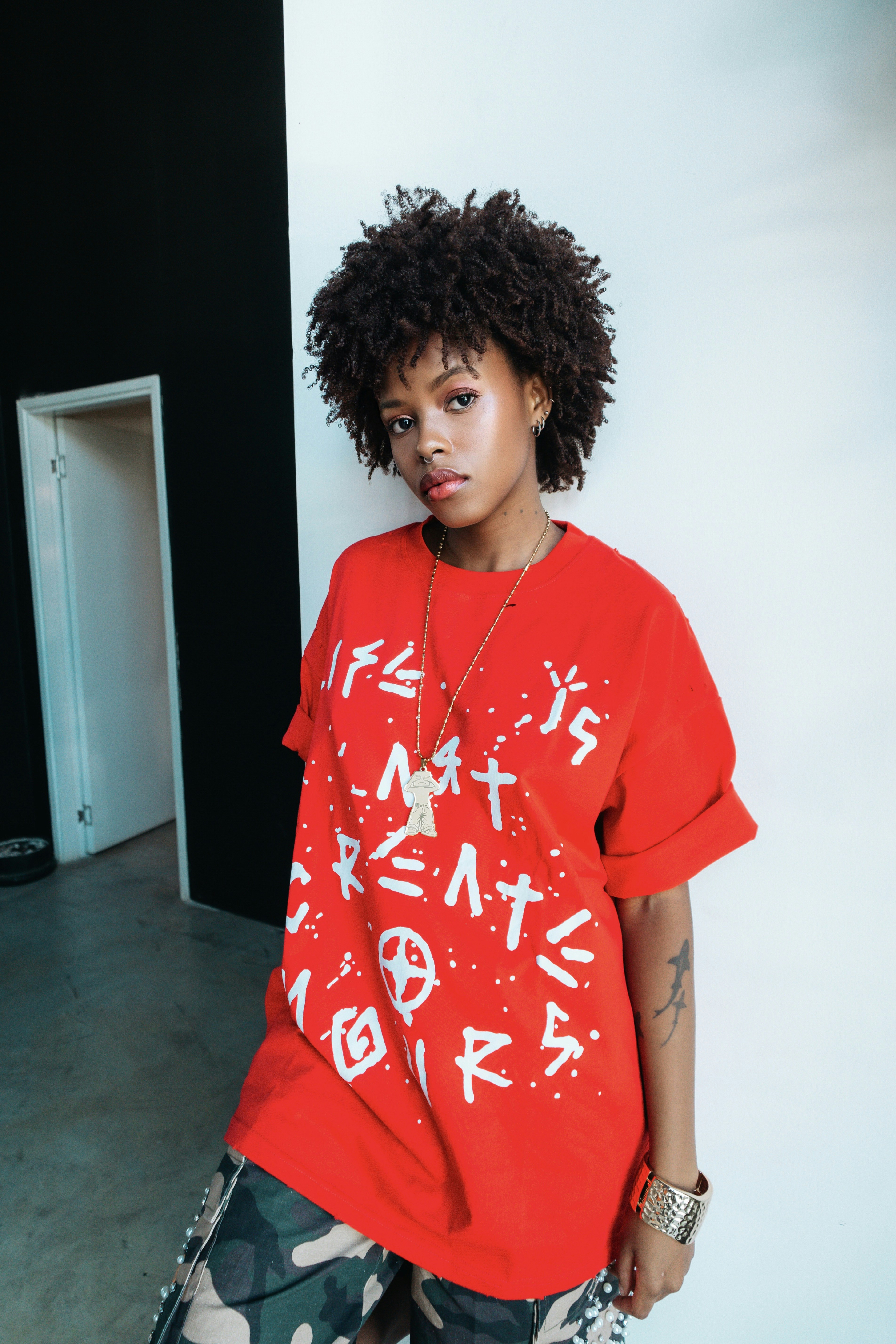 Red Shirt, Quiet Confidence: Portrait in a Studio Glow