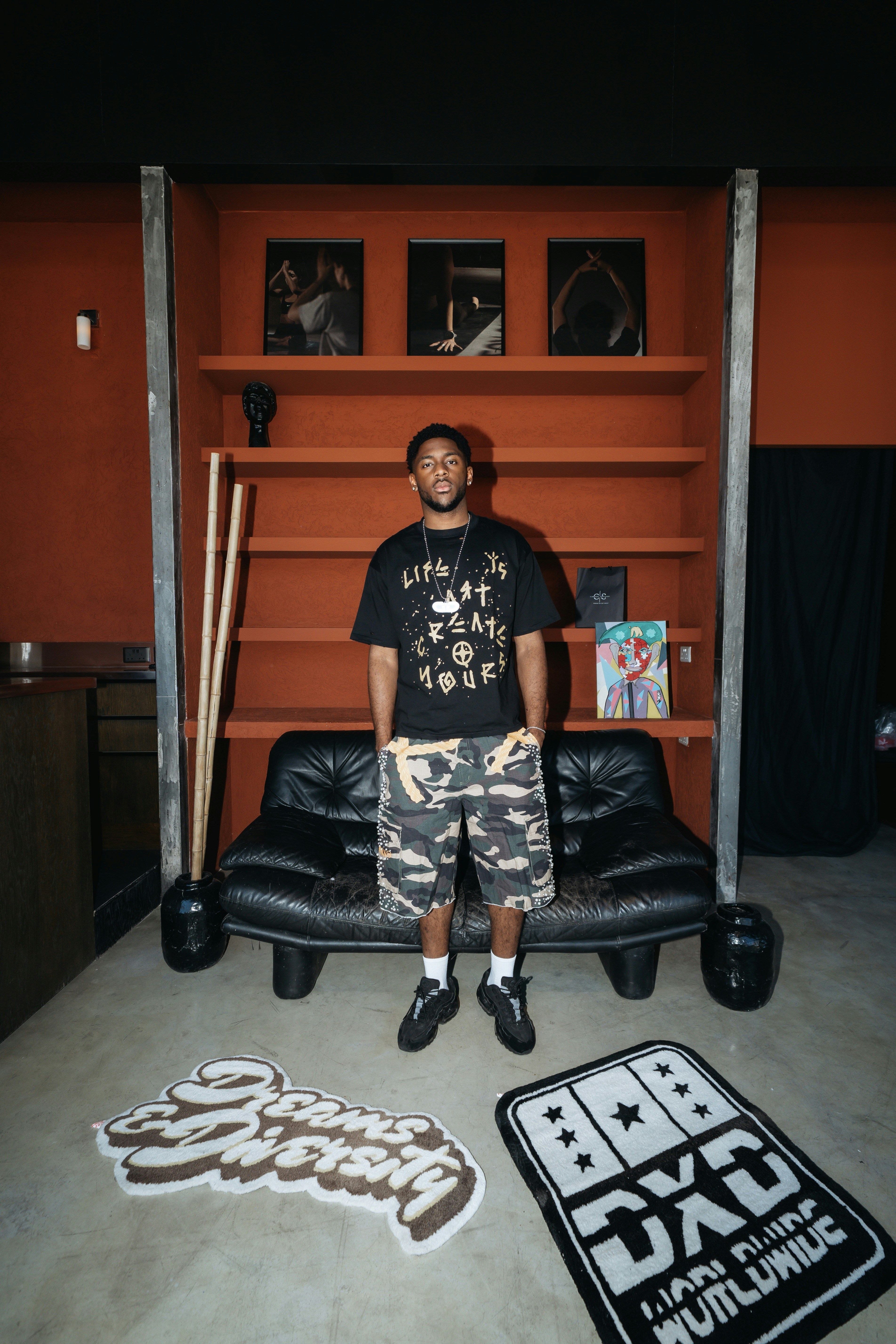 Standout in the Orange Studio: Portrait Beneath Shelves