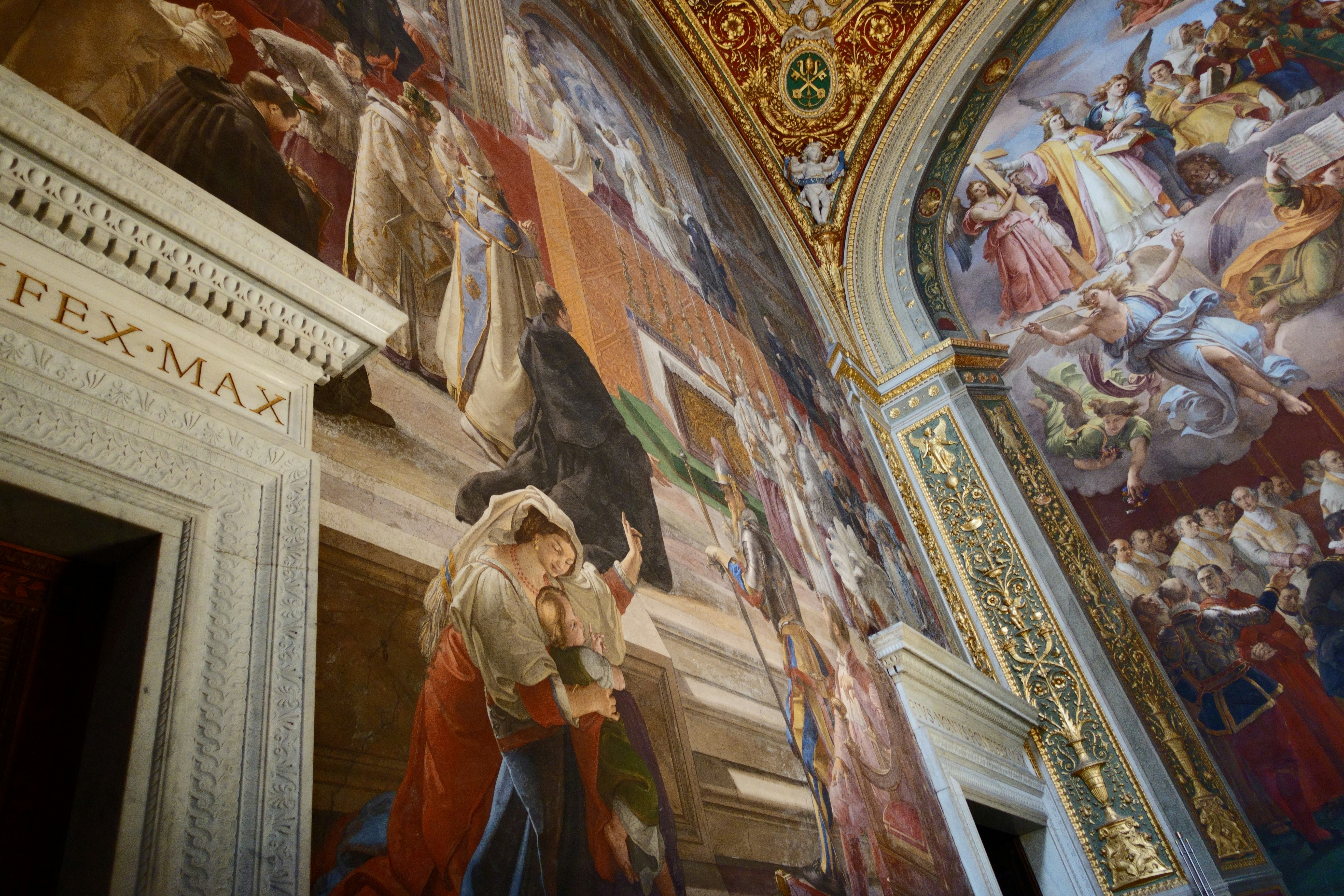Frescoed Ceiling and Painted Archway: A Battle of Colors in a Sacred Hall
