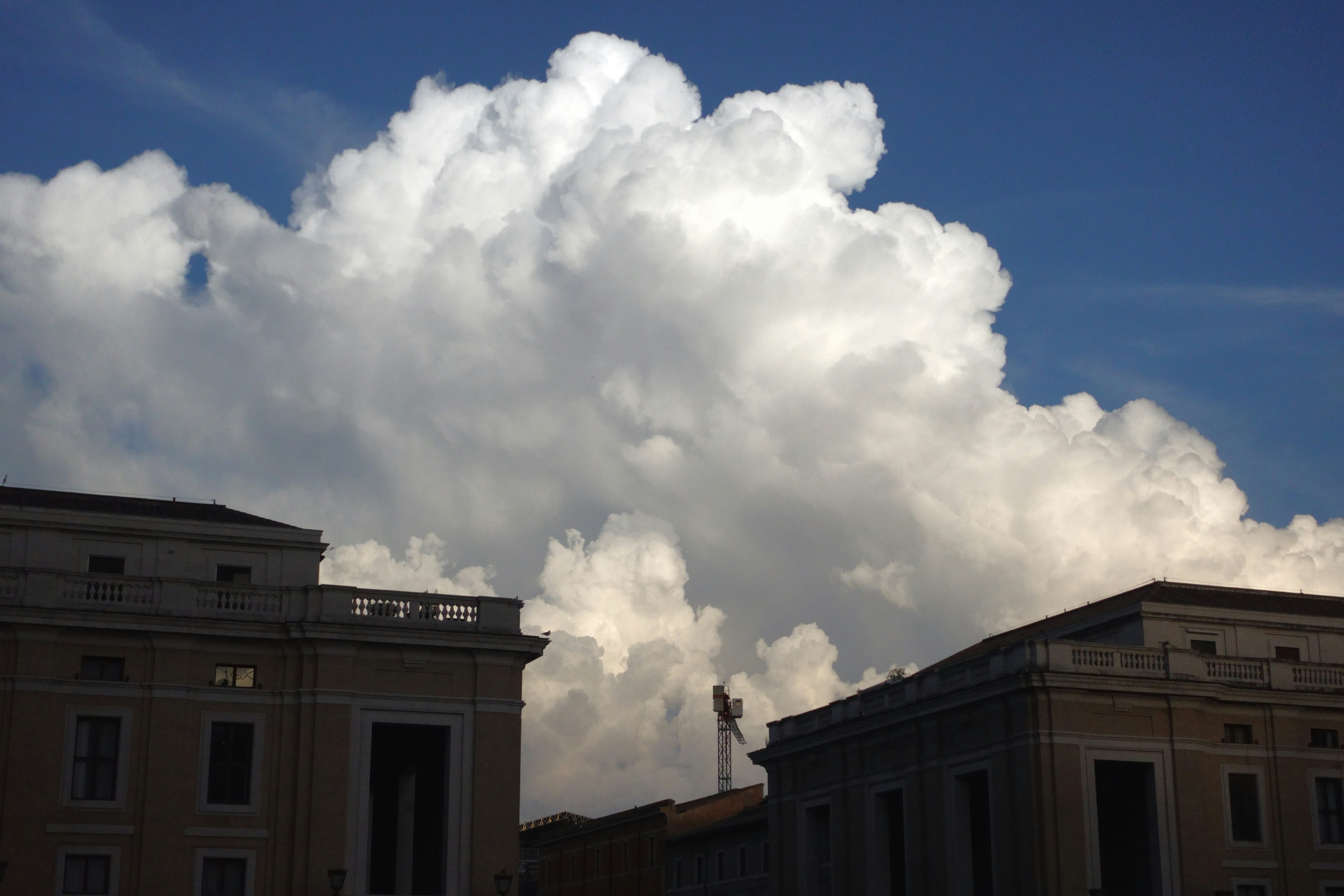 Cloudscape Over Classical Facades