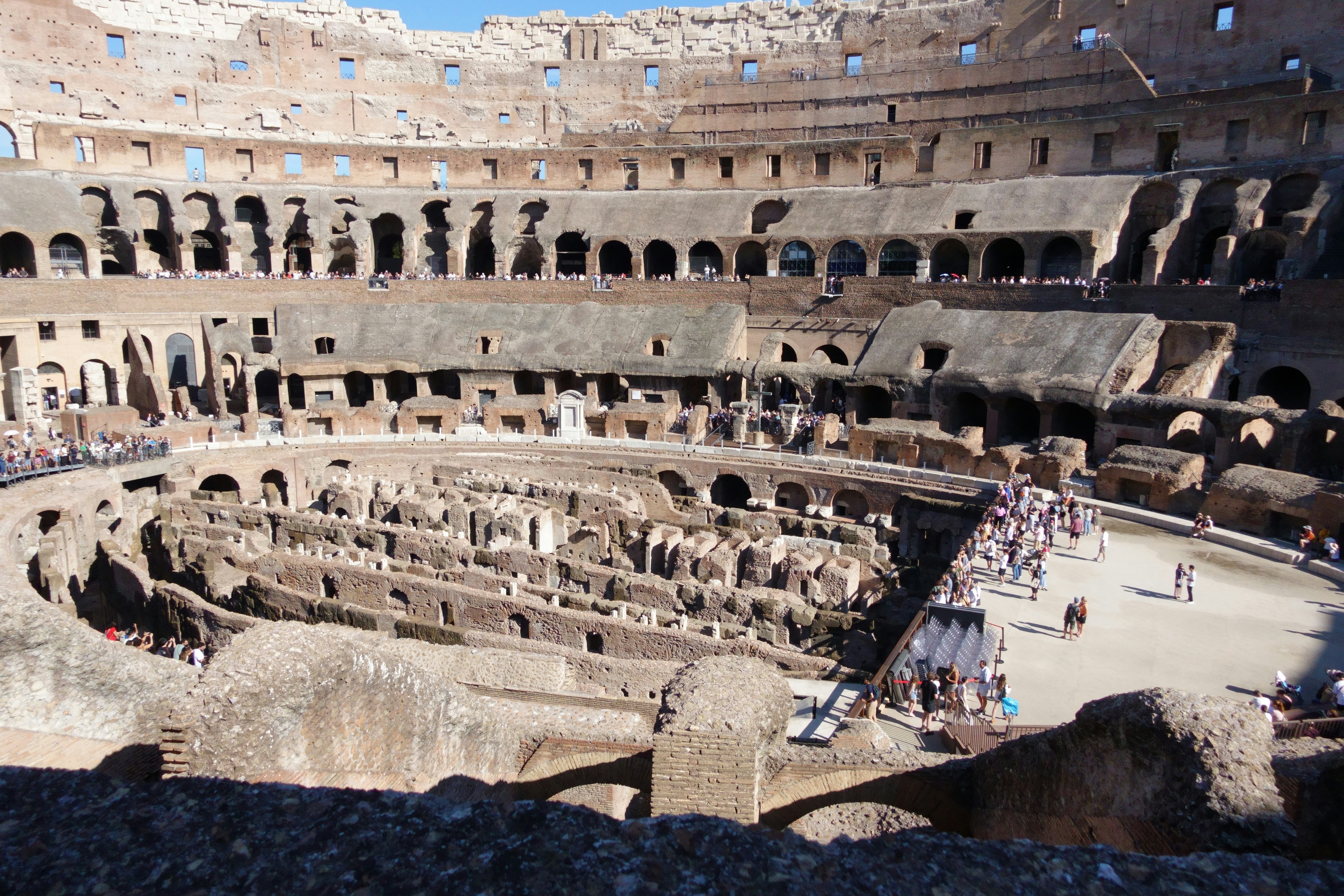 Echoes of Stone: Tourists in the Ring at the Colosseum