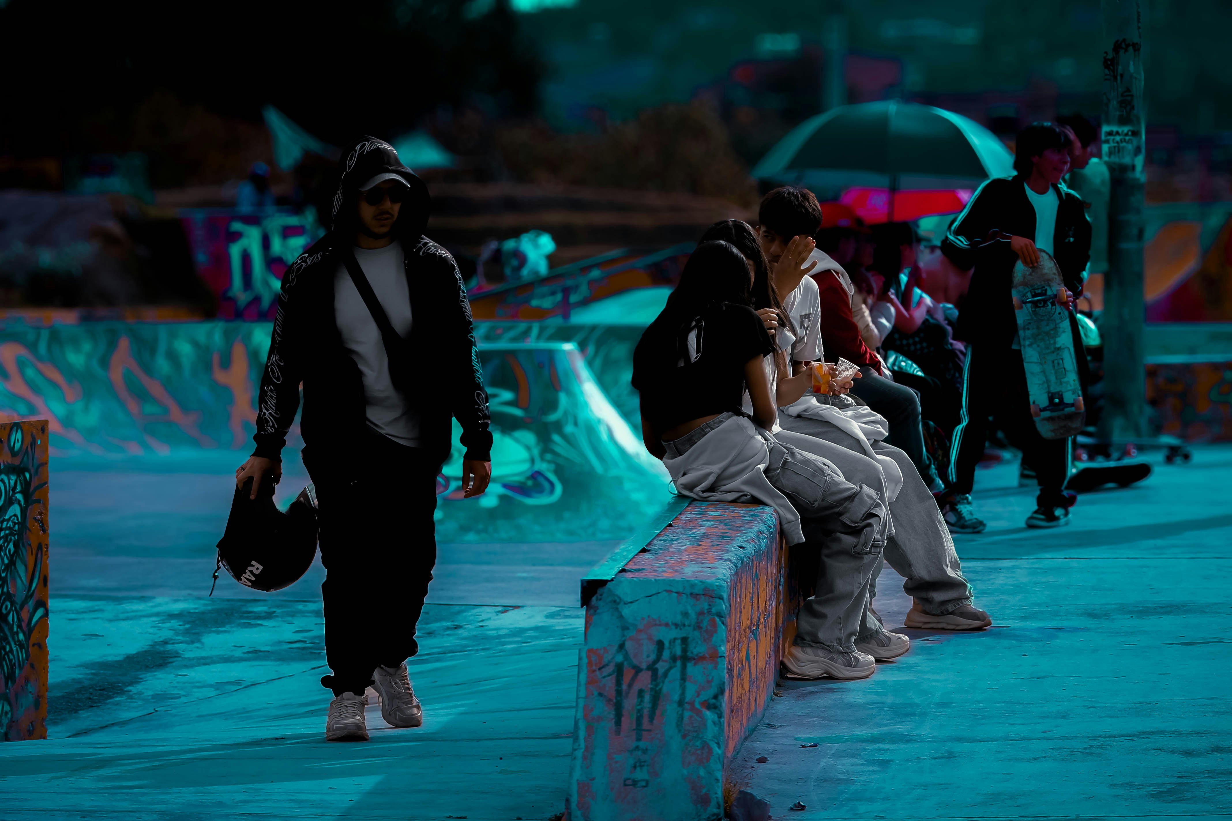 Mid-Session Pause at a Graffitied Skate Park