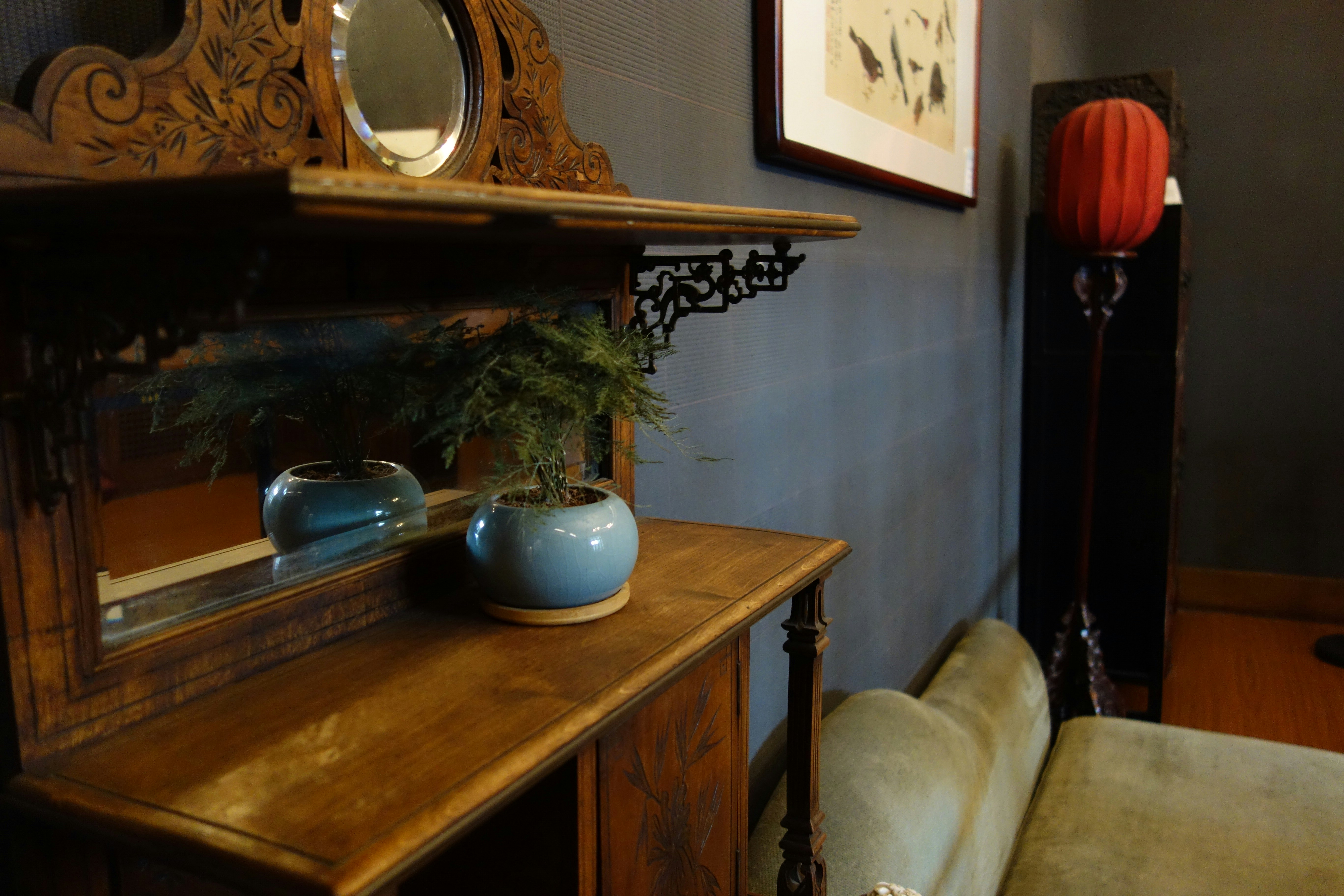 Antique Console with Ceramic Pots Reflects a Quiet Salon Scene
