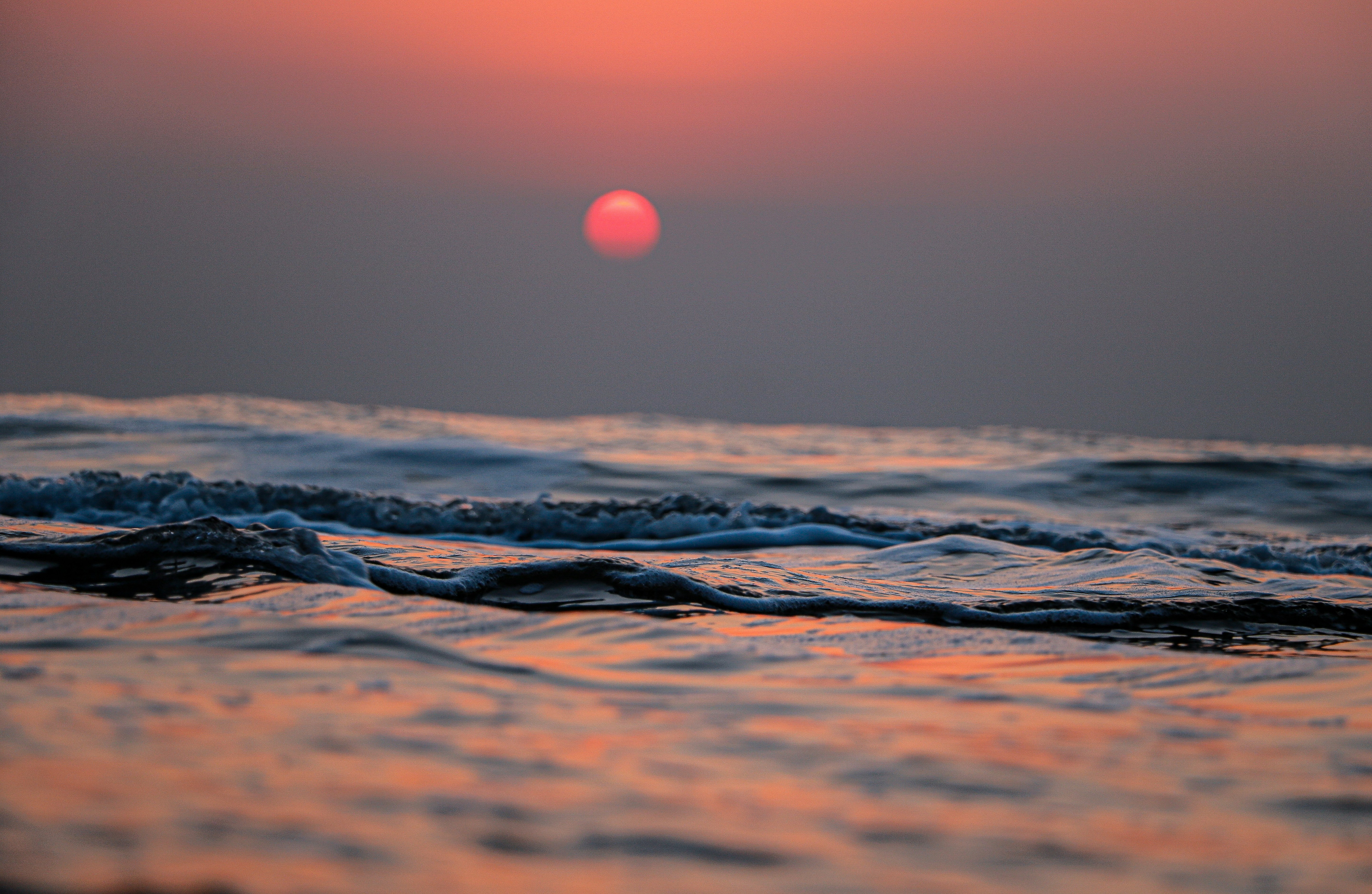 Sunset Over a Quiet Tidal Wake