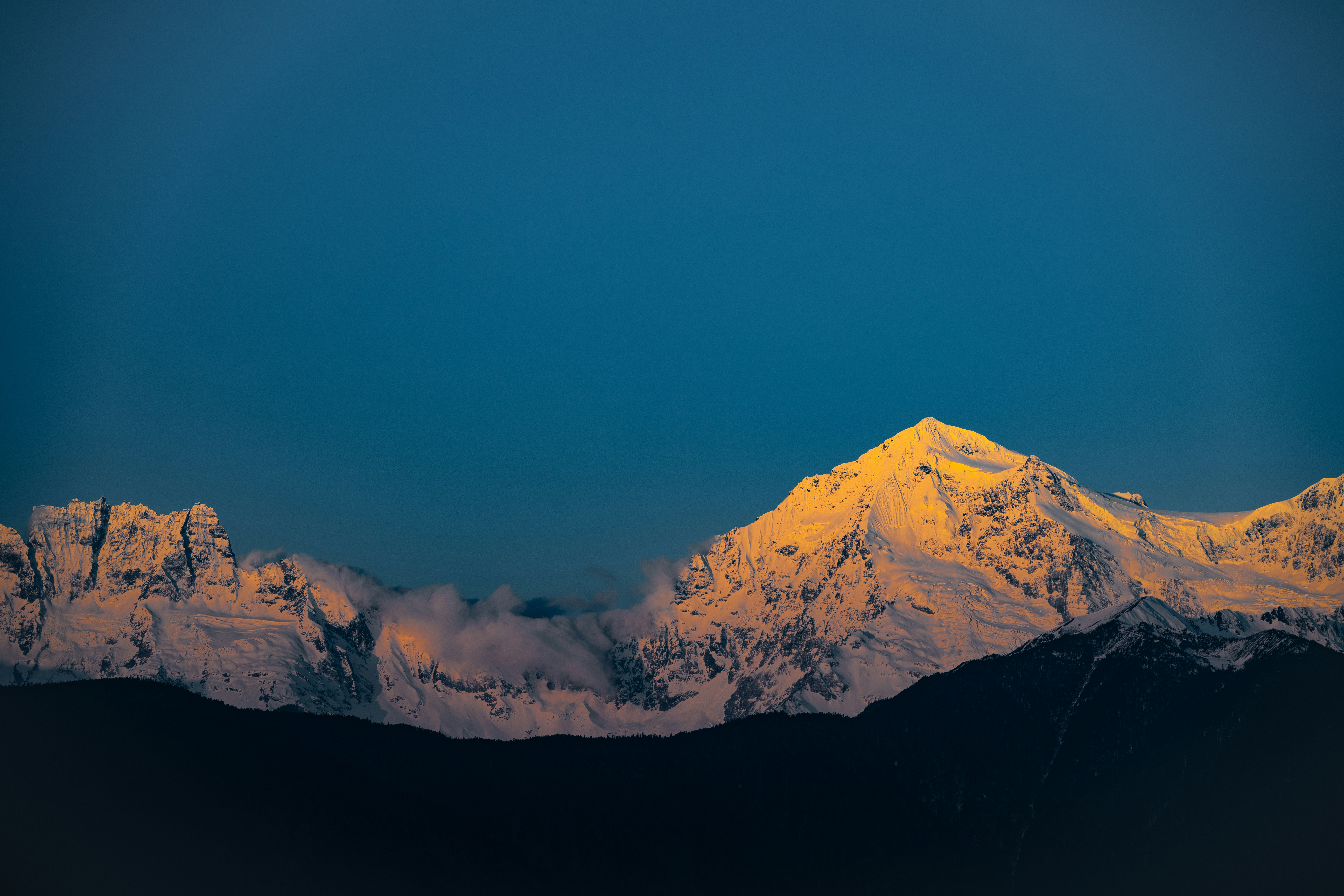 Golden Peak: First Light on a Rugged Crest
