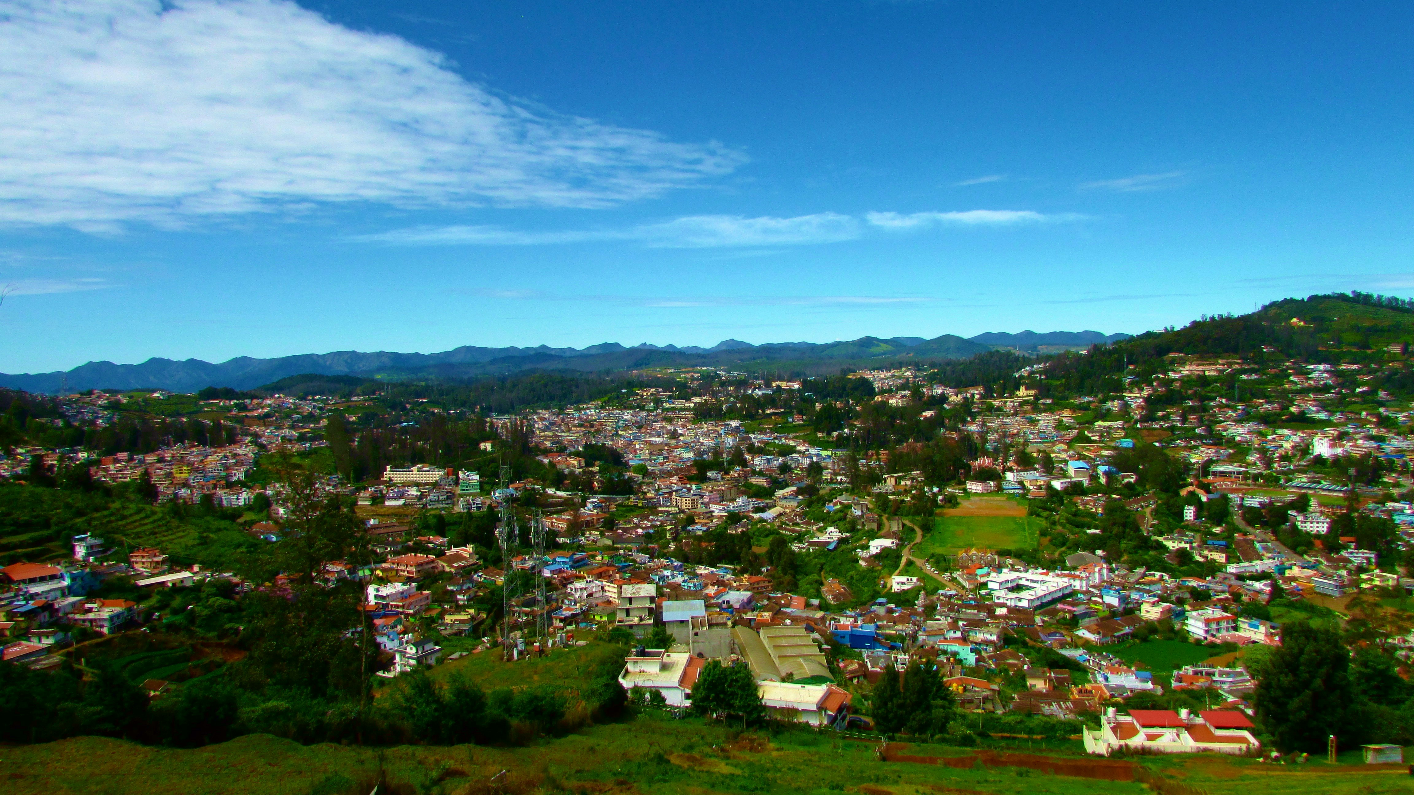 Humming Townscape: A Panoramic Valley Woven with Houses