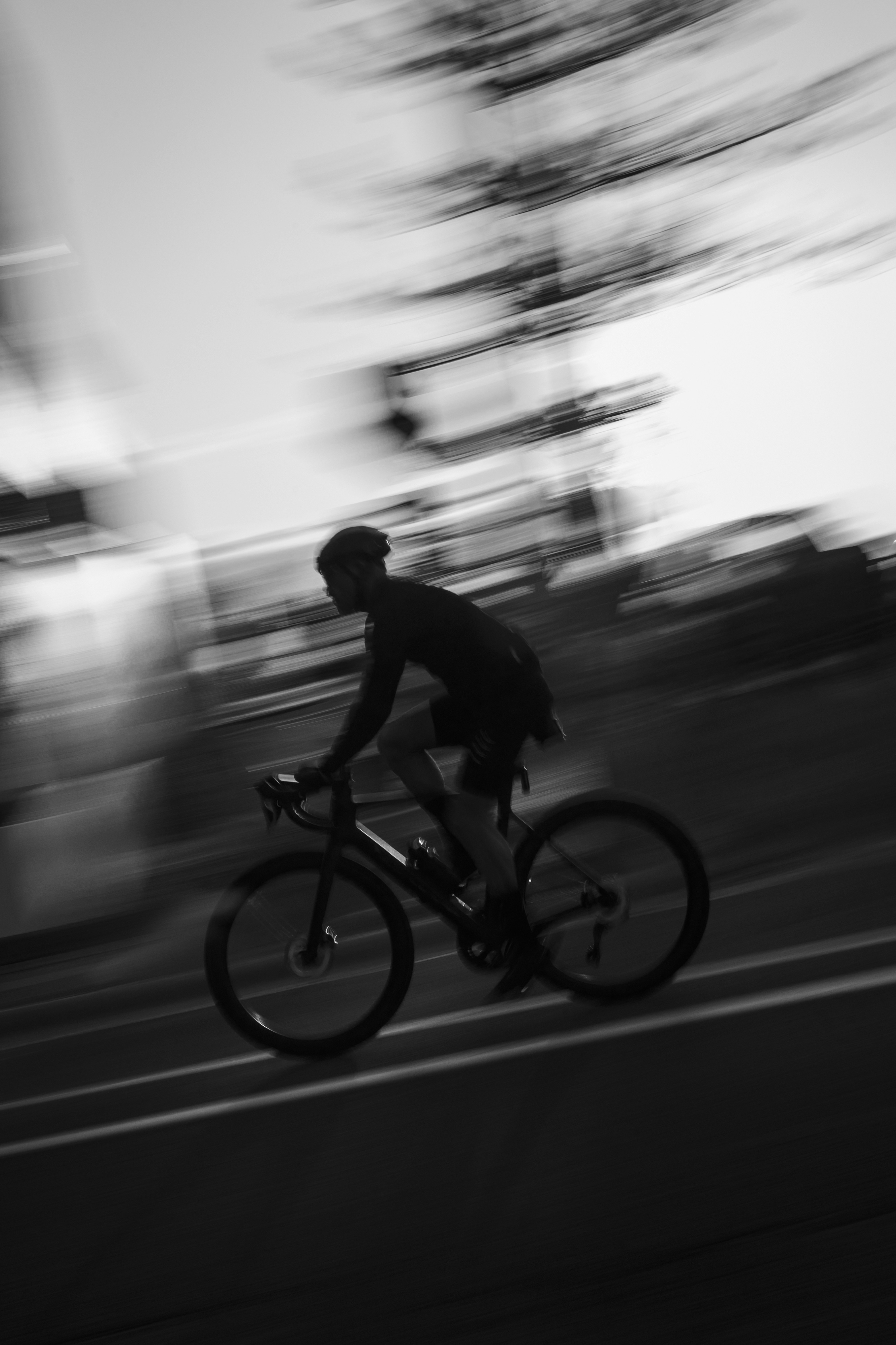 Midnight Ride: A Blurred Silhouette in Motion