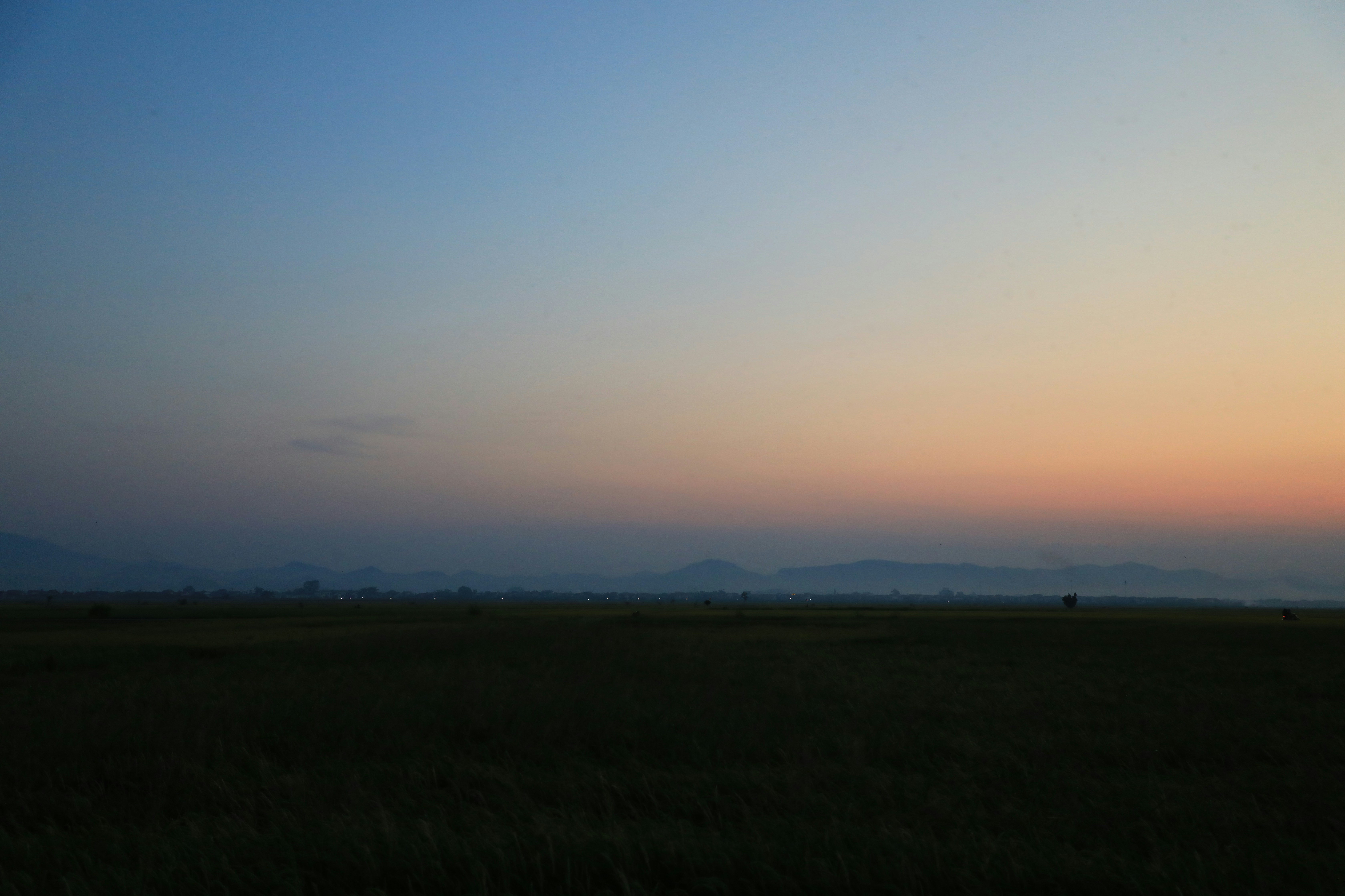 Hushed Horizon: Dusk Over Quiet Plains