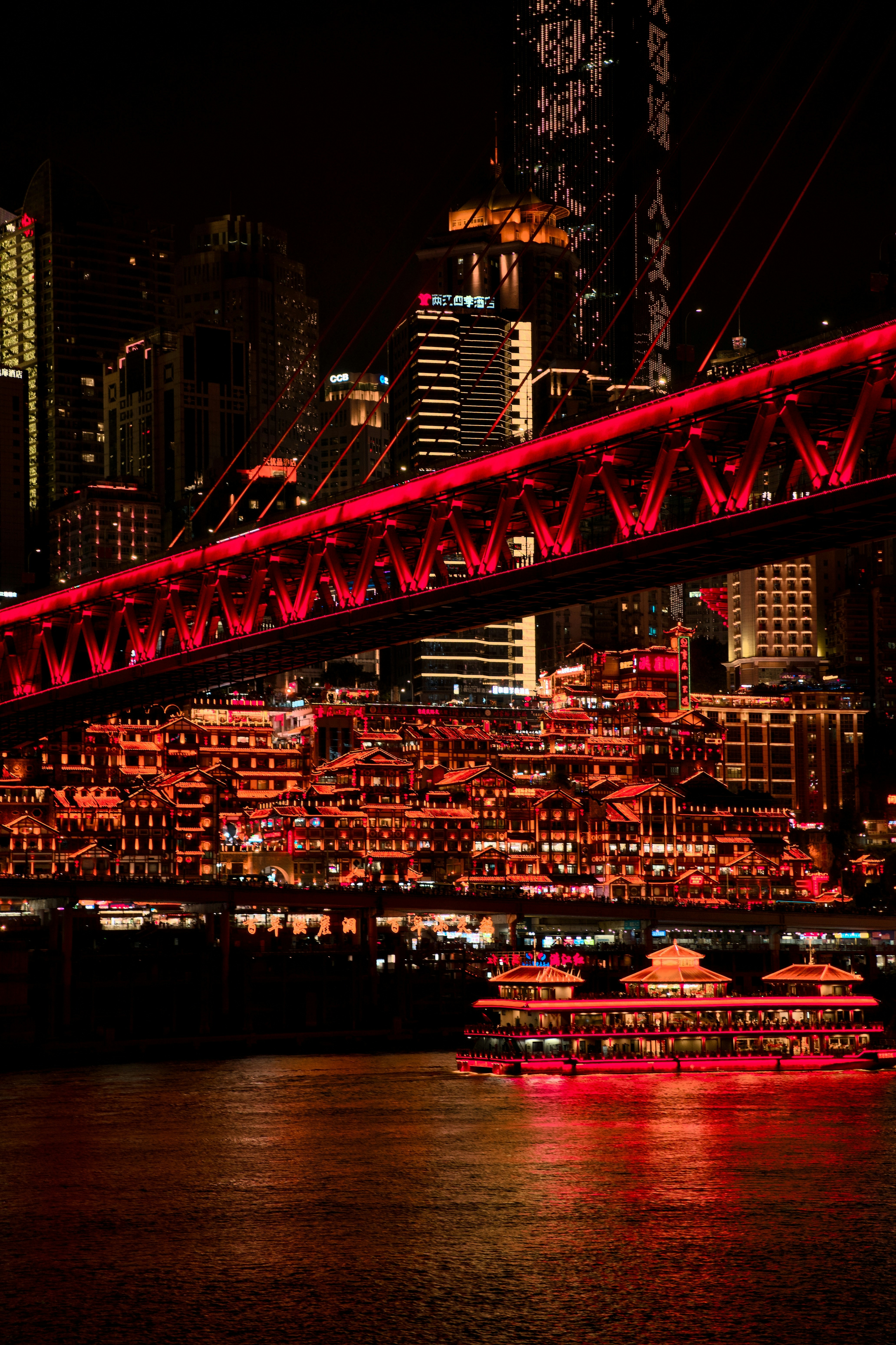 Neon Ribbon Over the River: Night Pulse of the City
