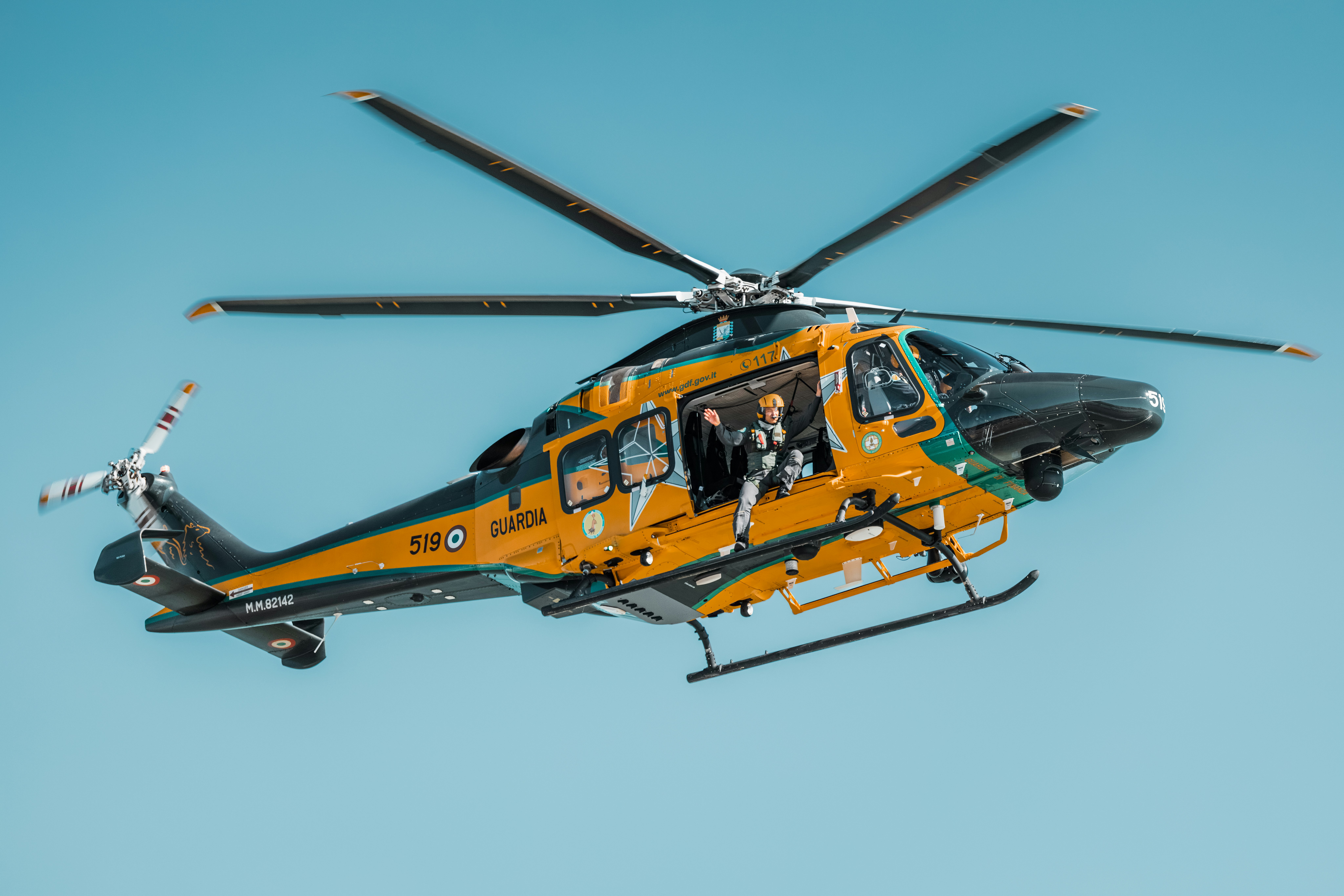 Rescue in the Skies: Orange and Gray Chimera in Flight