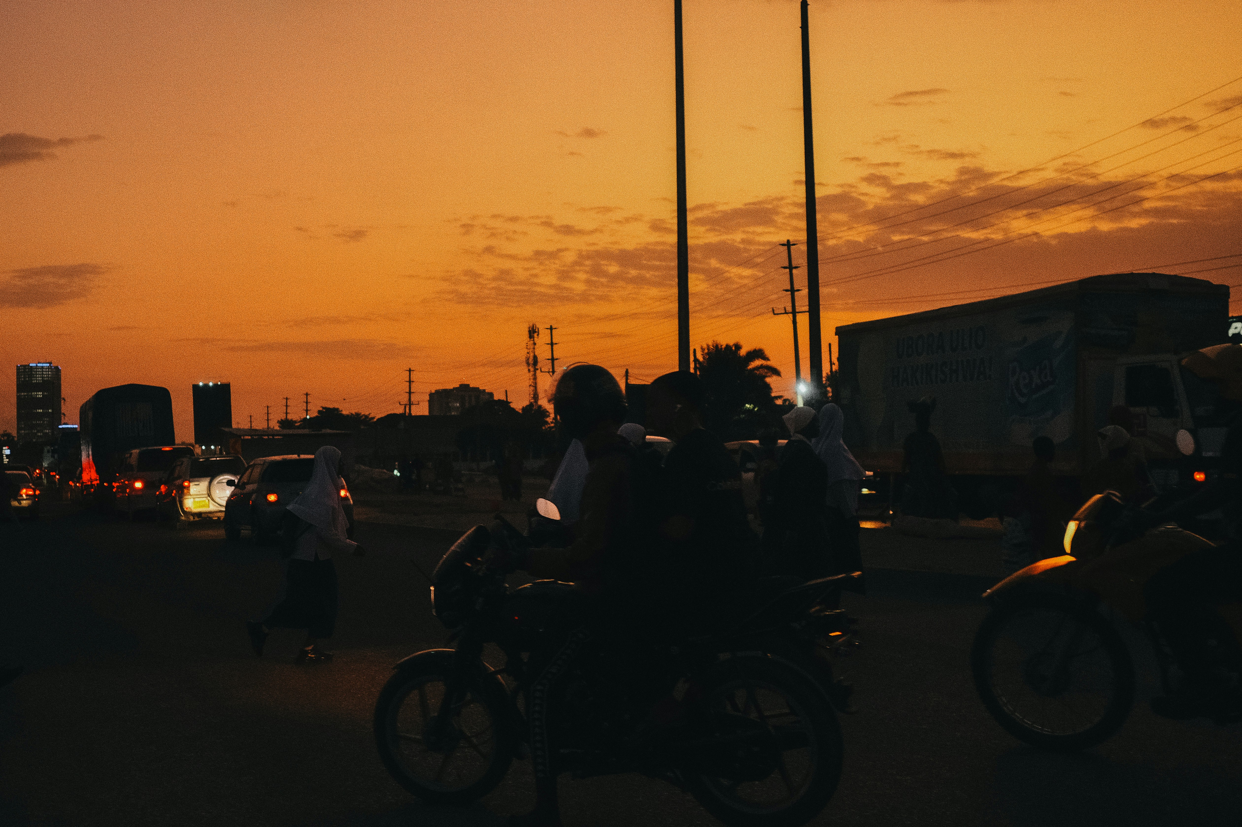 Dusk on the Boulevard: Motorbikes and silhouettes at sunset