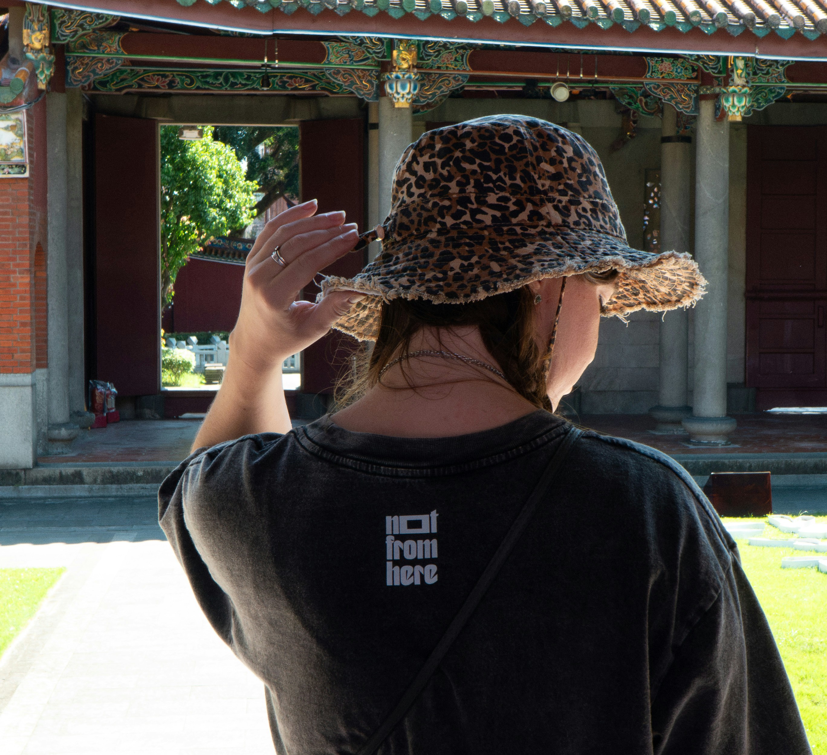 Leopard Hat, Quiet Portrait at a Temple Courtyard
