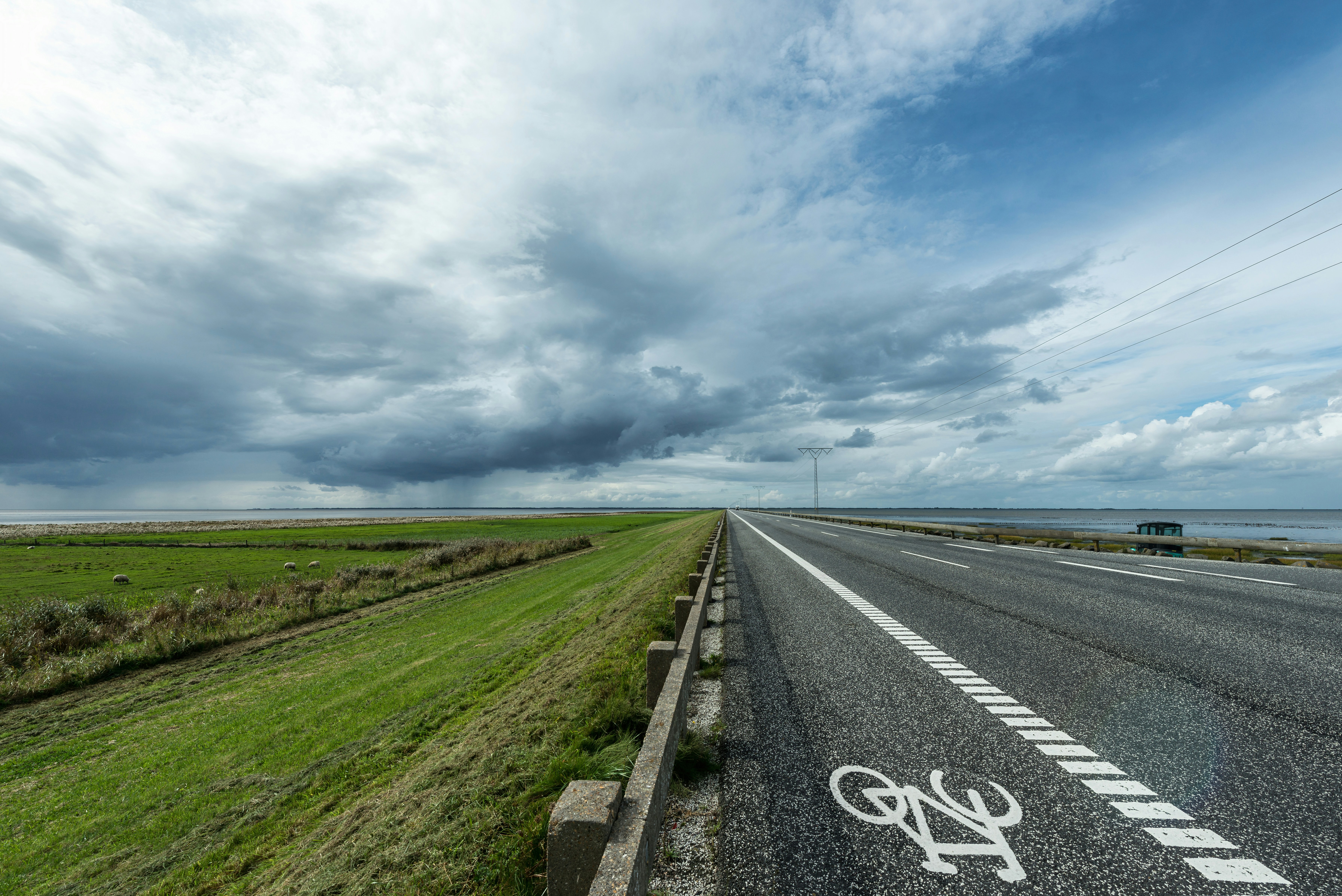 Endless Road Under Stormy Skies