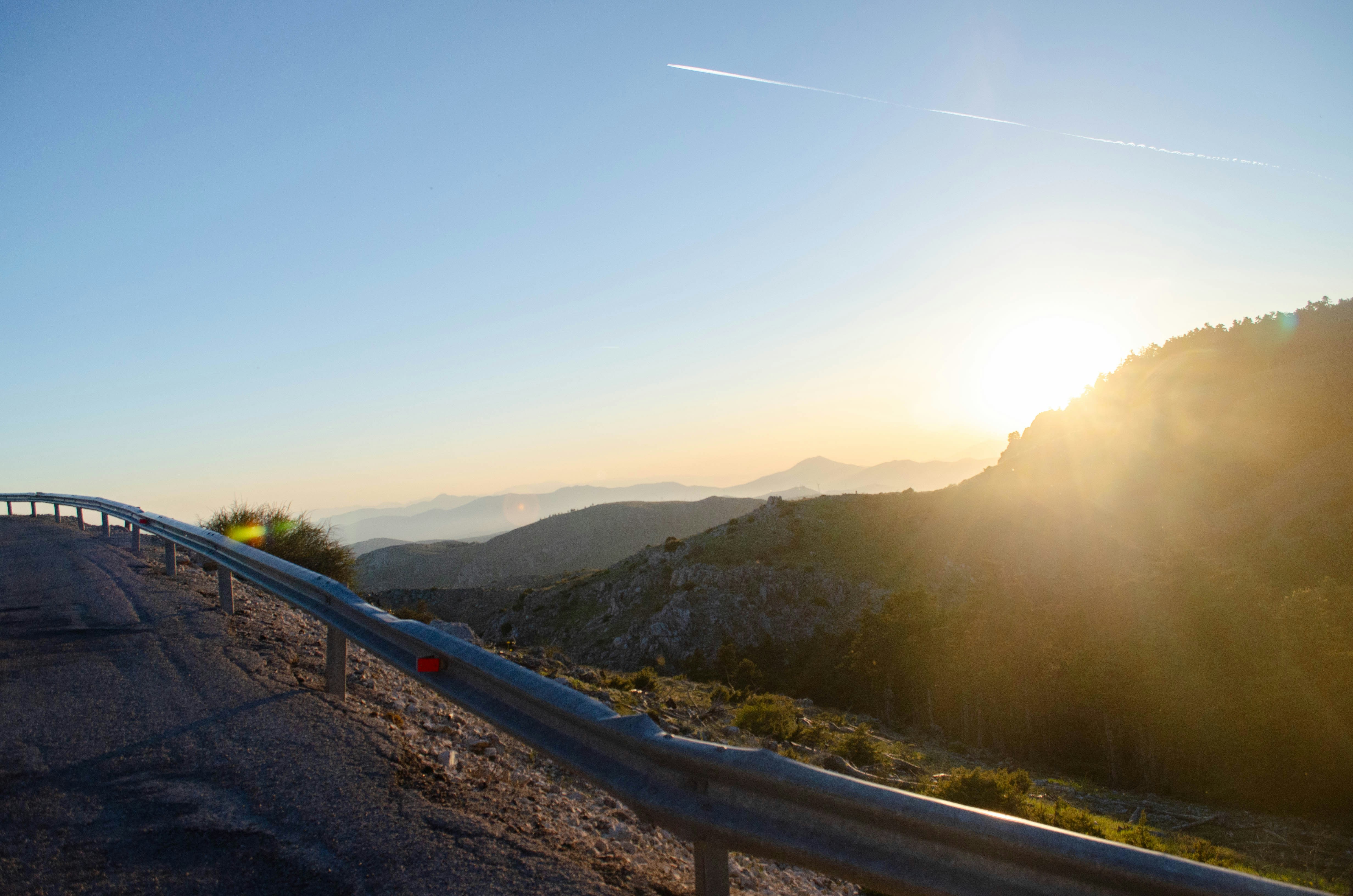 Highway Bend at Sunset Over Serene Ridge