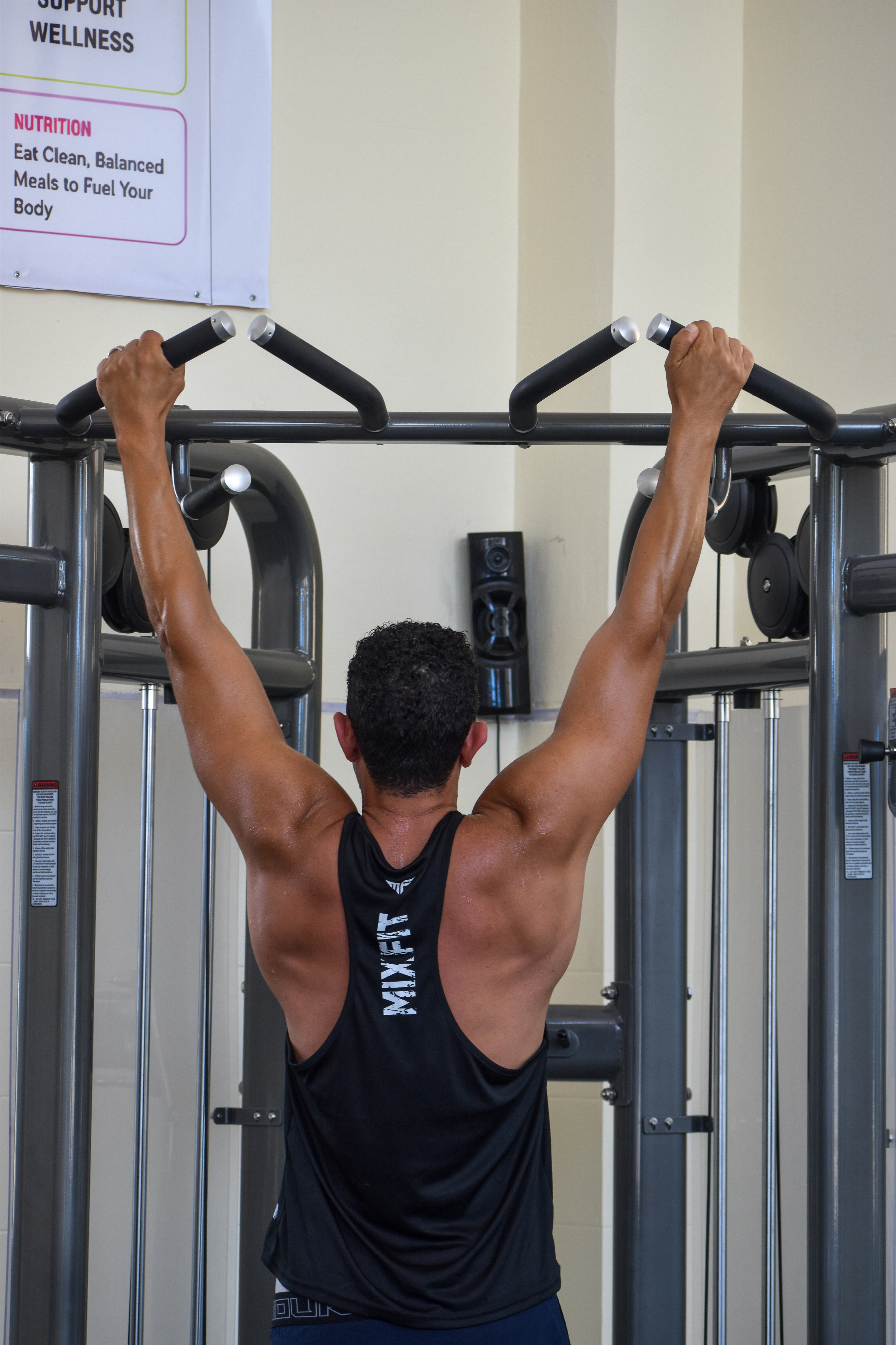 Overhead Pull: Power and Form in a Gym Lane
