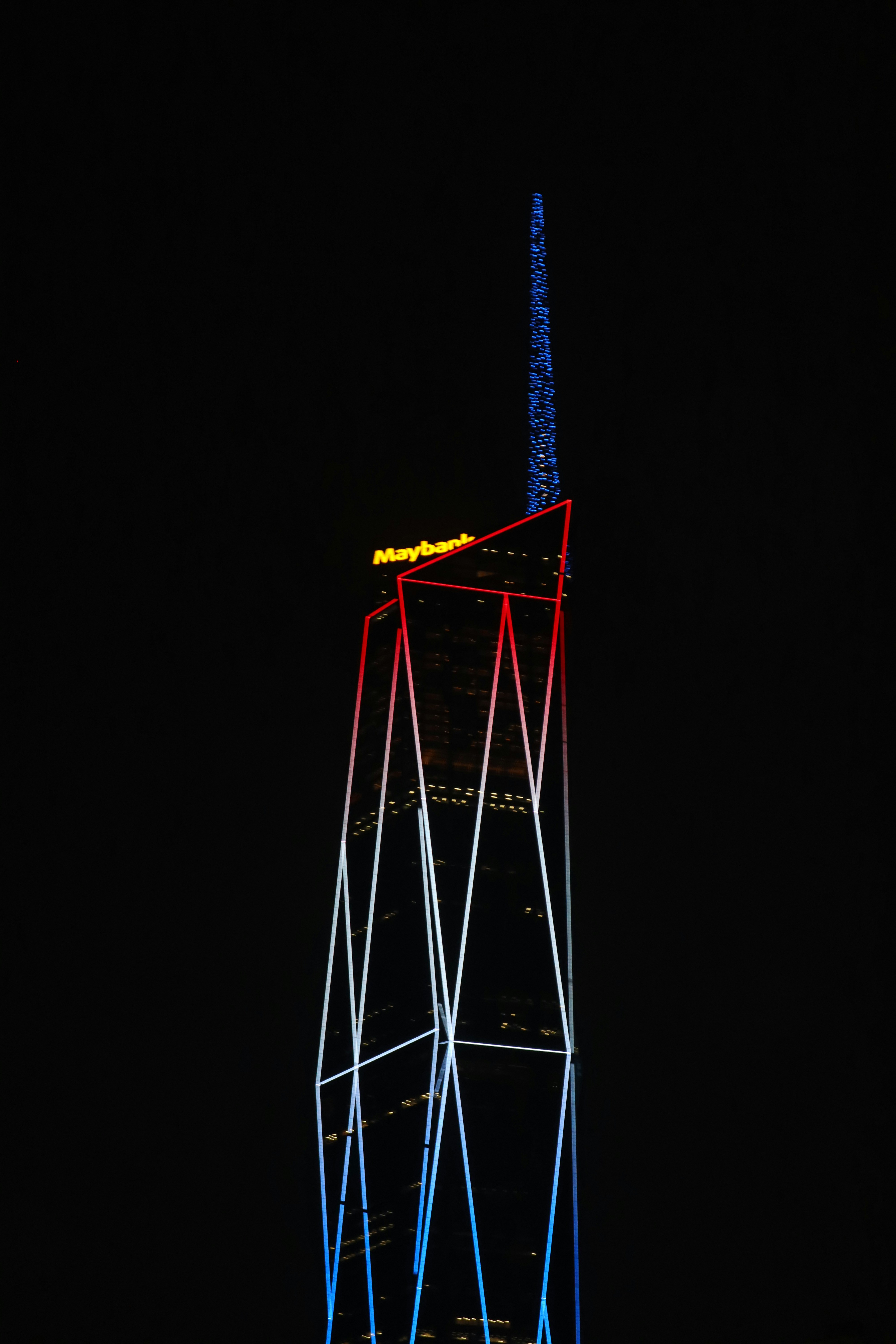 Neon-Crystal Peak: A Nighttime Bank Tower in Color