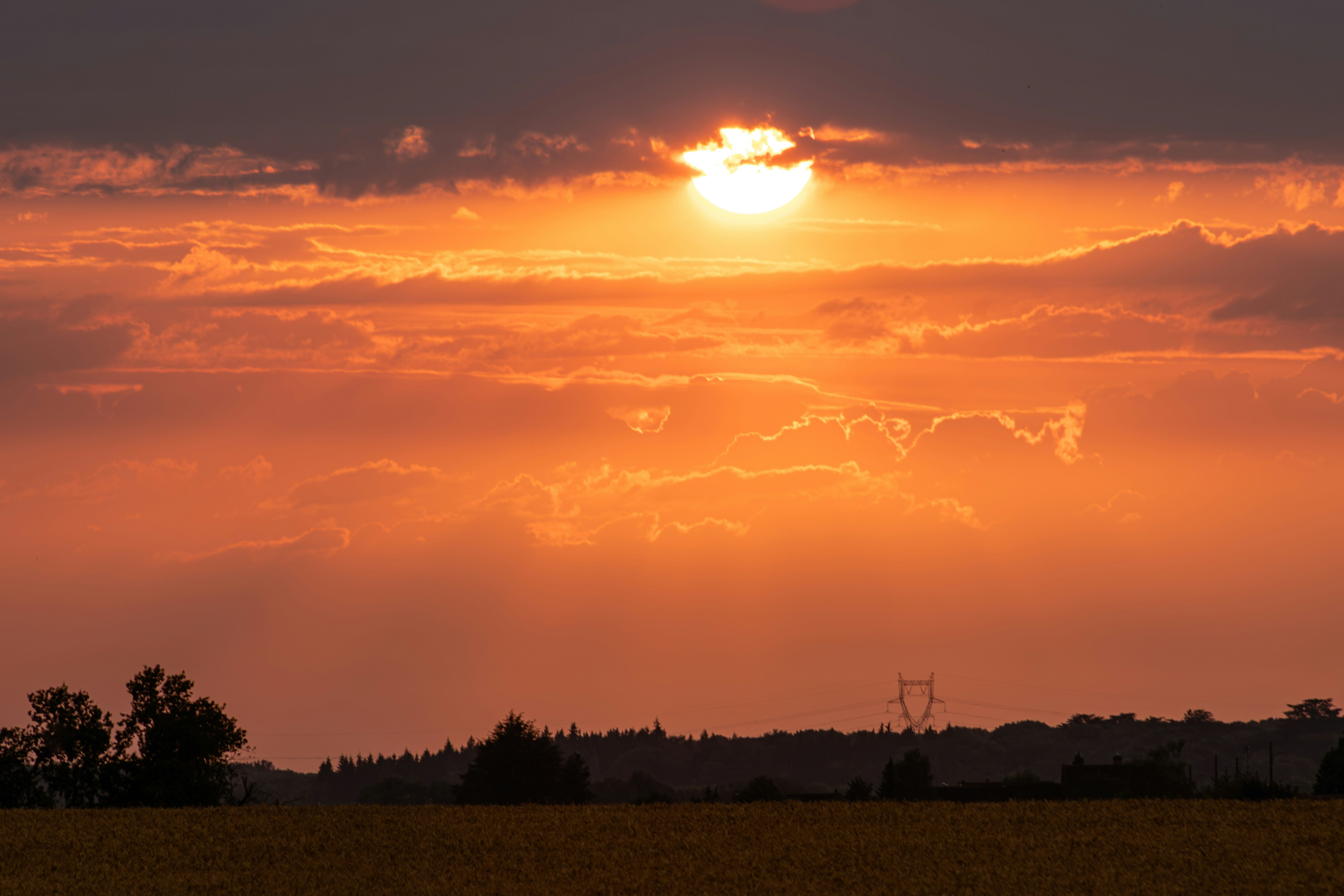 Sunset Spotlight over a Flat Horizon