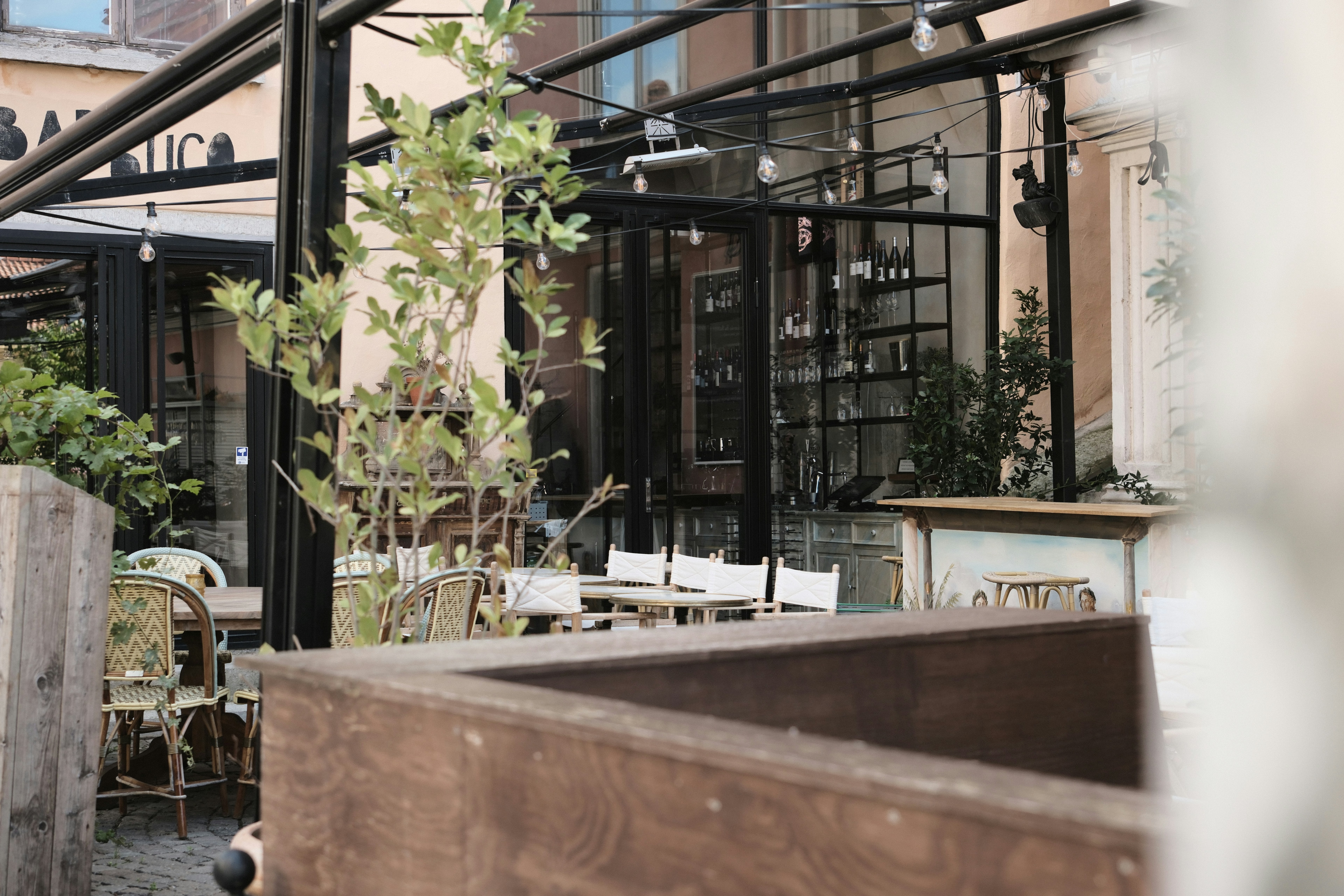 Café Courtyard with Weathered Wood and Urban Light