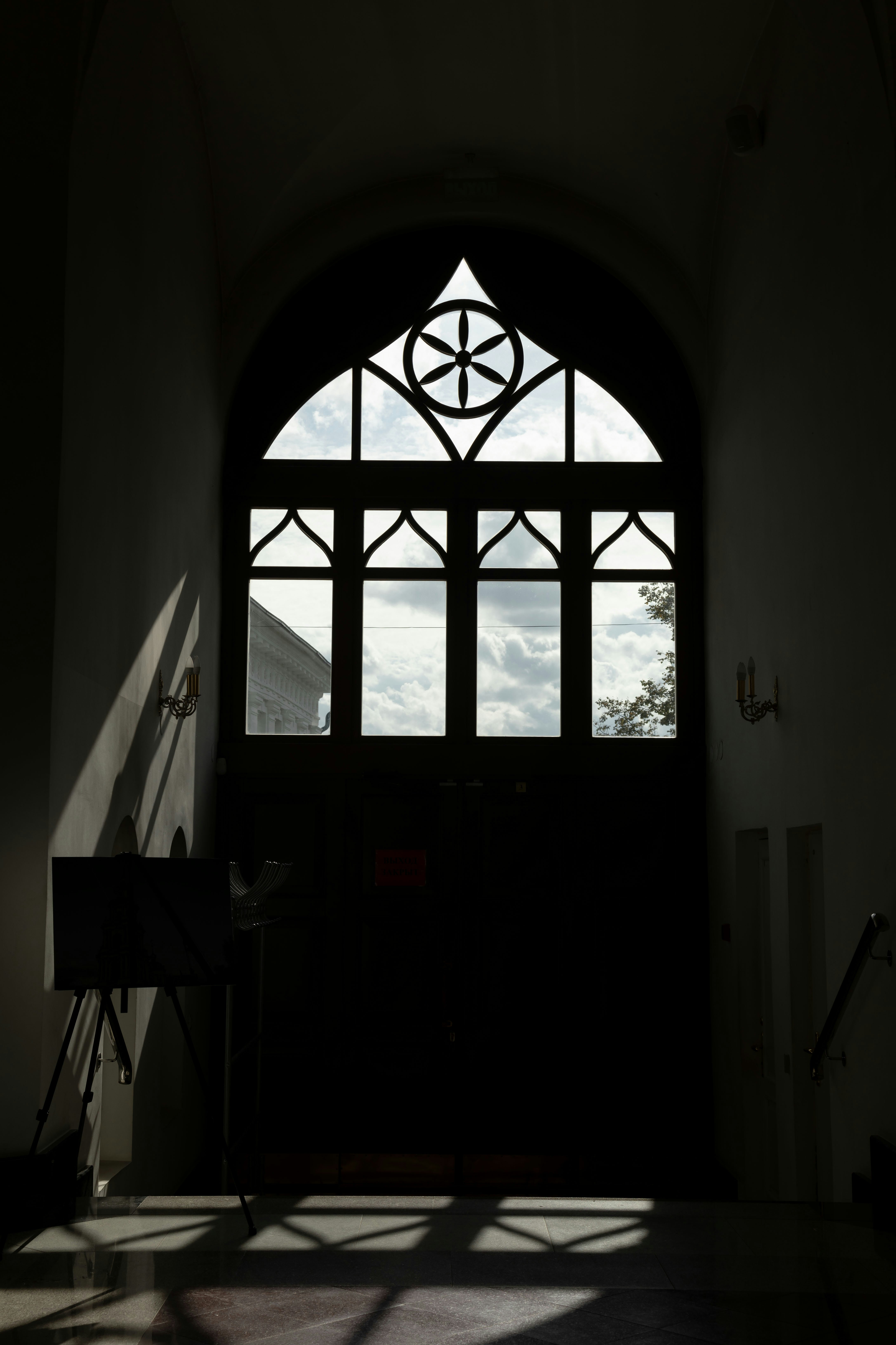 Light Through Sacred Arches: Silhouetted Interior at Dusk