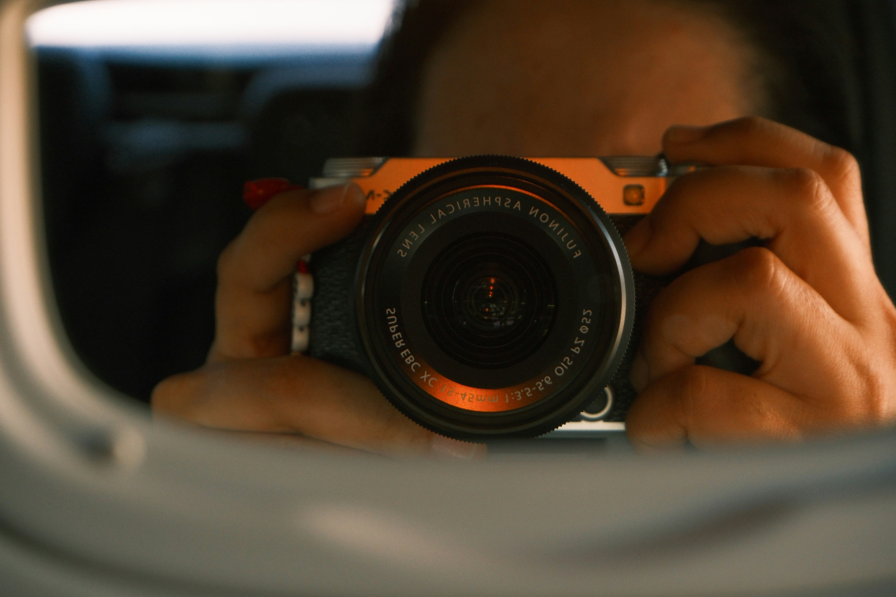 Orange Retro: A Hands-On Moment with a Vintage-Inspired Camera