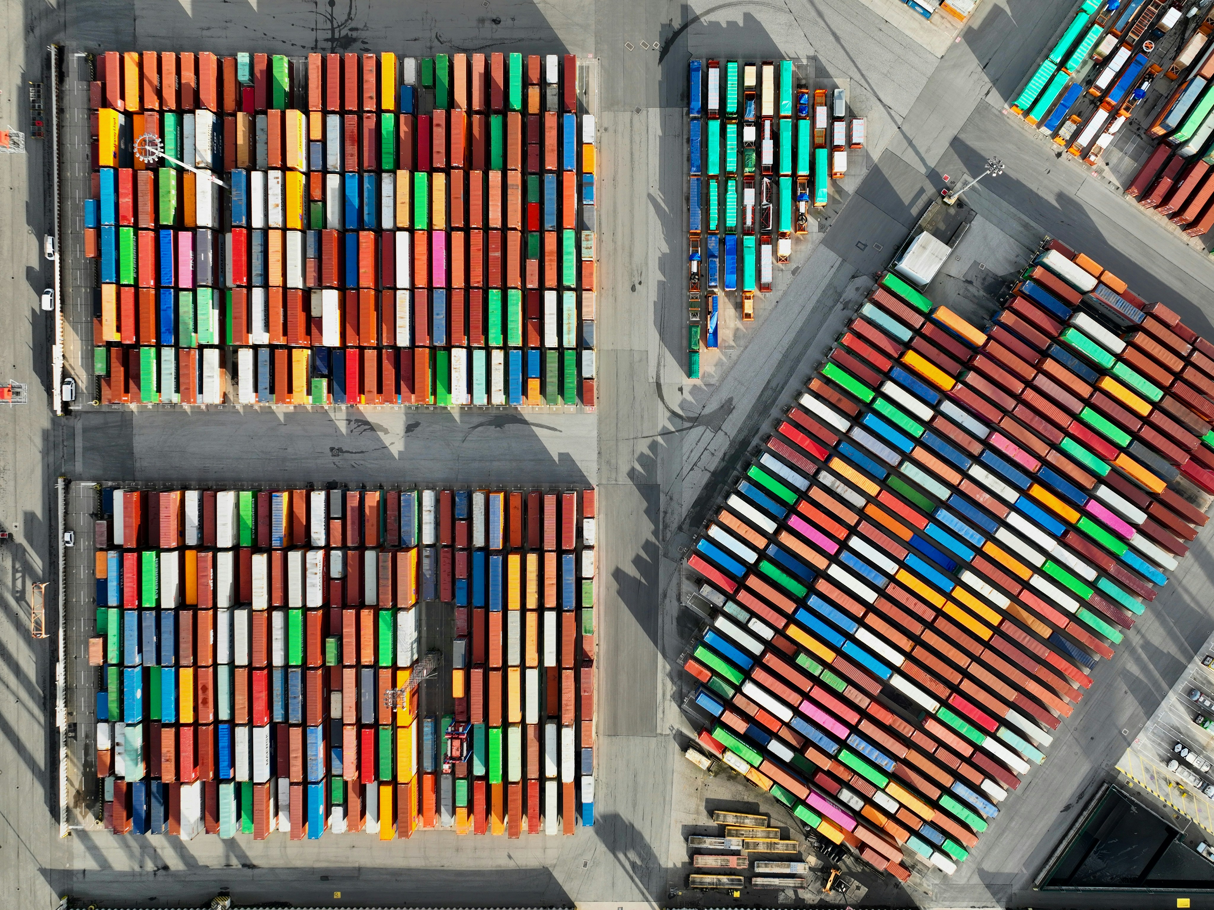 Colorful Container Grid: Aerial Palette of Shipping Blocks