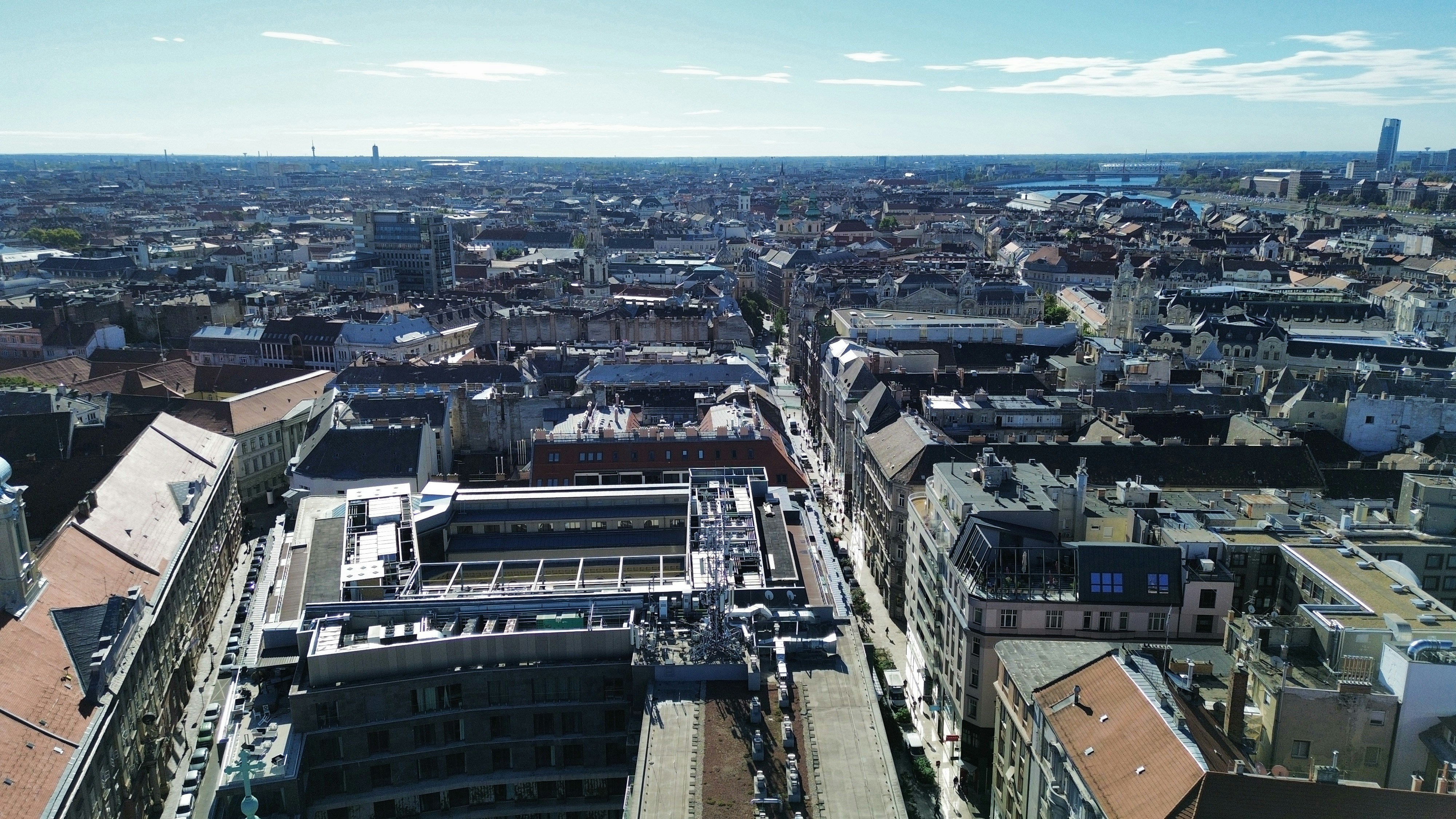 Urban Tapestry: A City Ridge of Buildings under a Clear Sky
