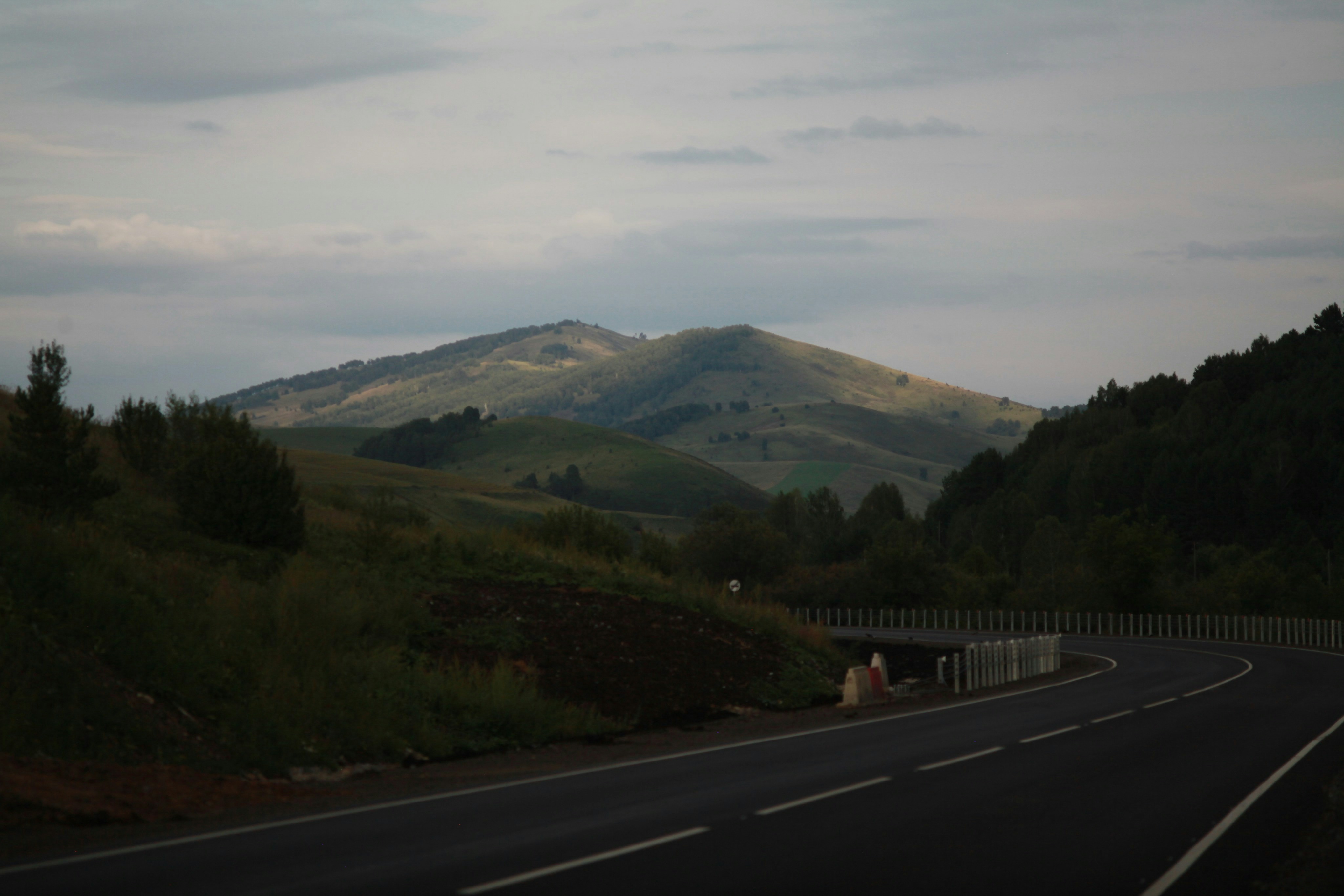 Curving Highway Toward Quiet Hills