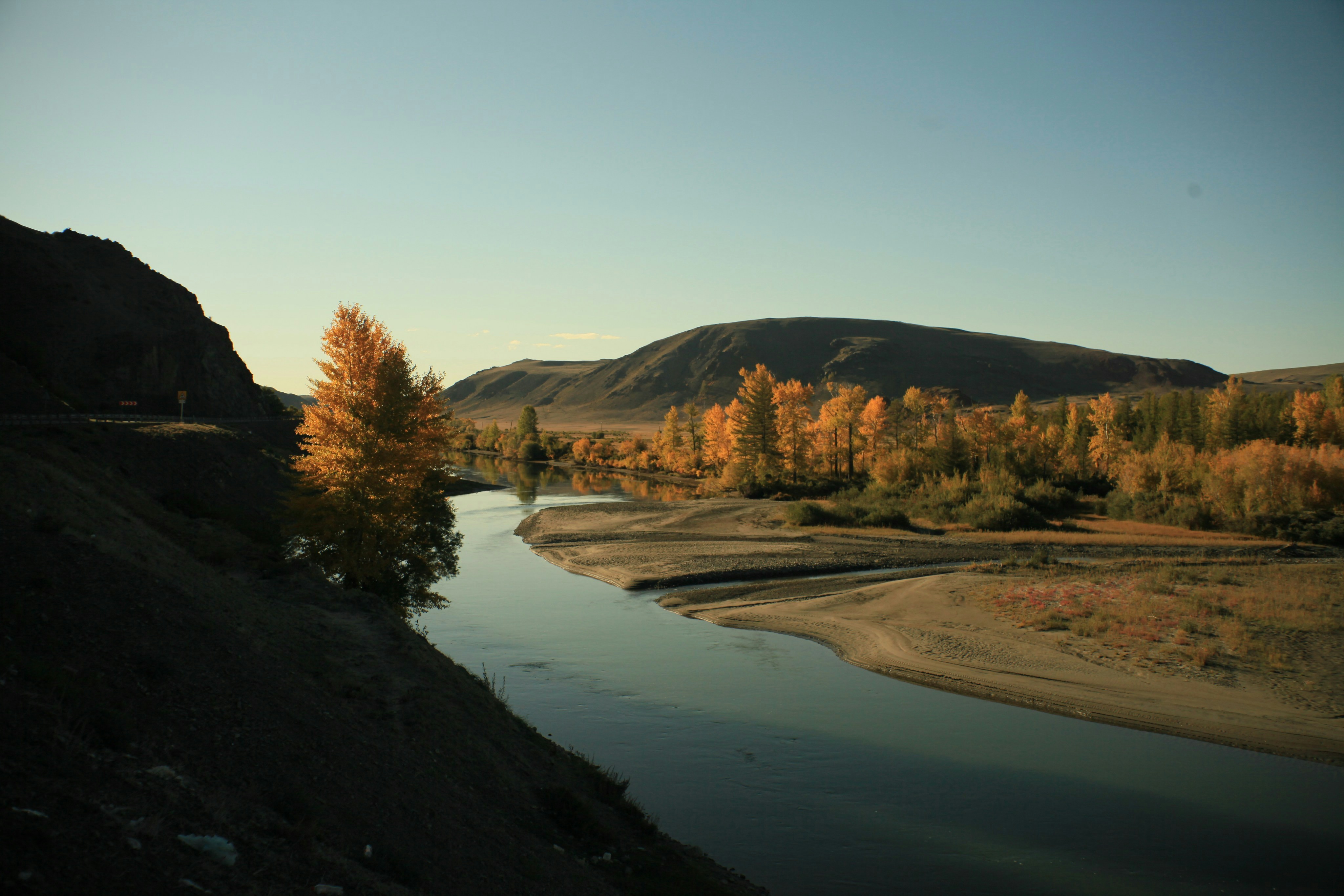 Autumn River Bend: Golden Trees and Quiet Water